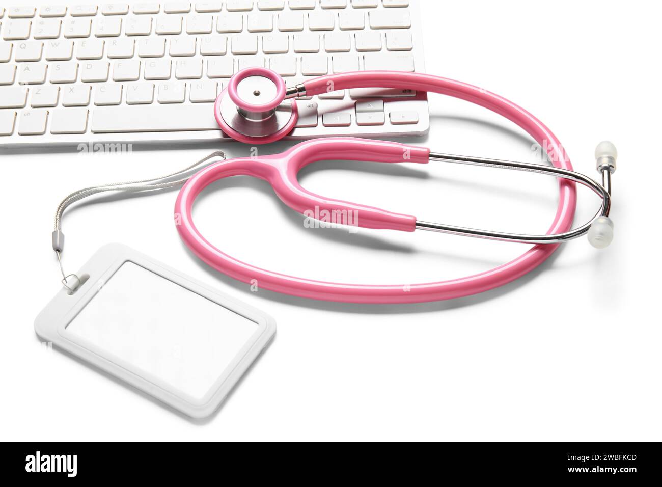Stethoscope, pc keyboard and badge on white background Stock Photo - Alamy