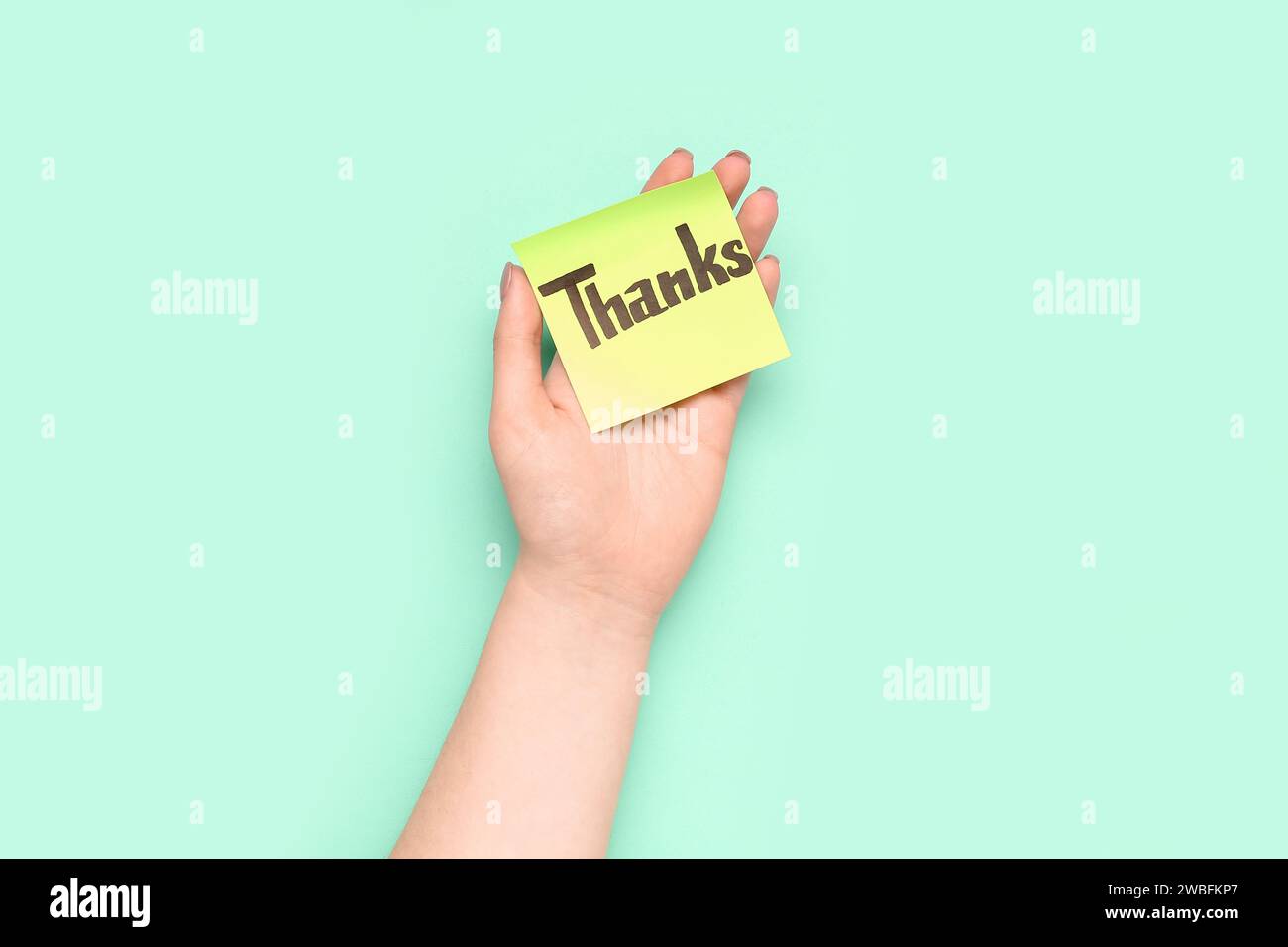 Hand holding sticky note written note hi-res stock photography and ...