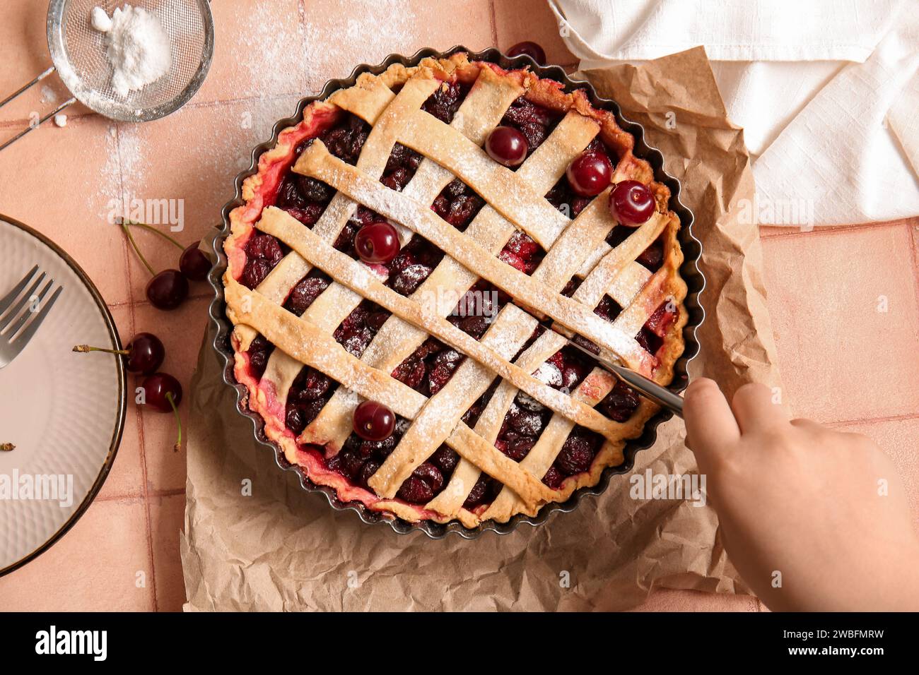 Woman cutting pie cherry hi-res stock photography and images - Alamy
