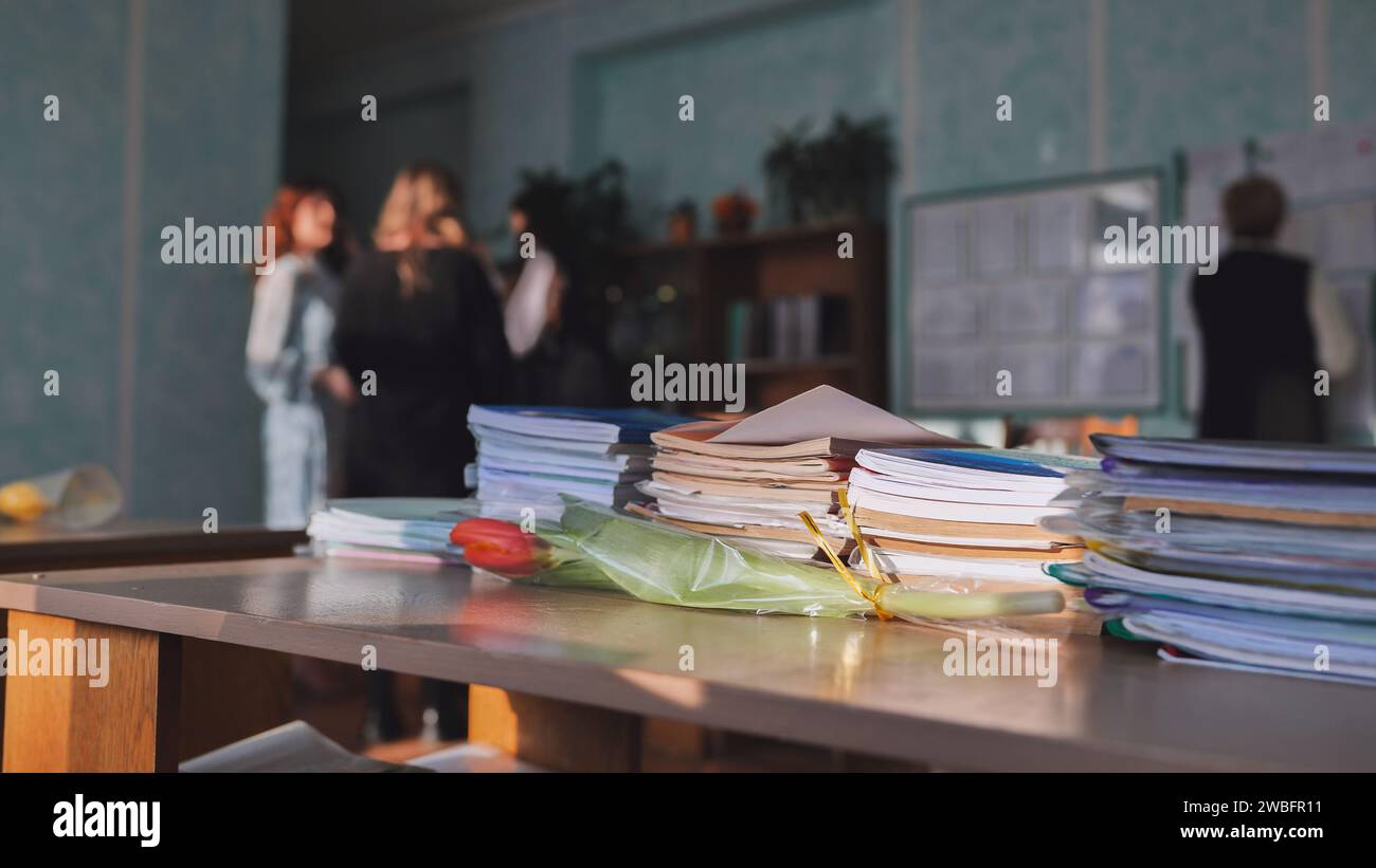 Stacks of books and notebooks in a school classroom during recess Stock ...