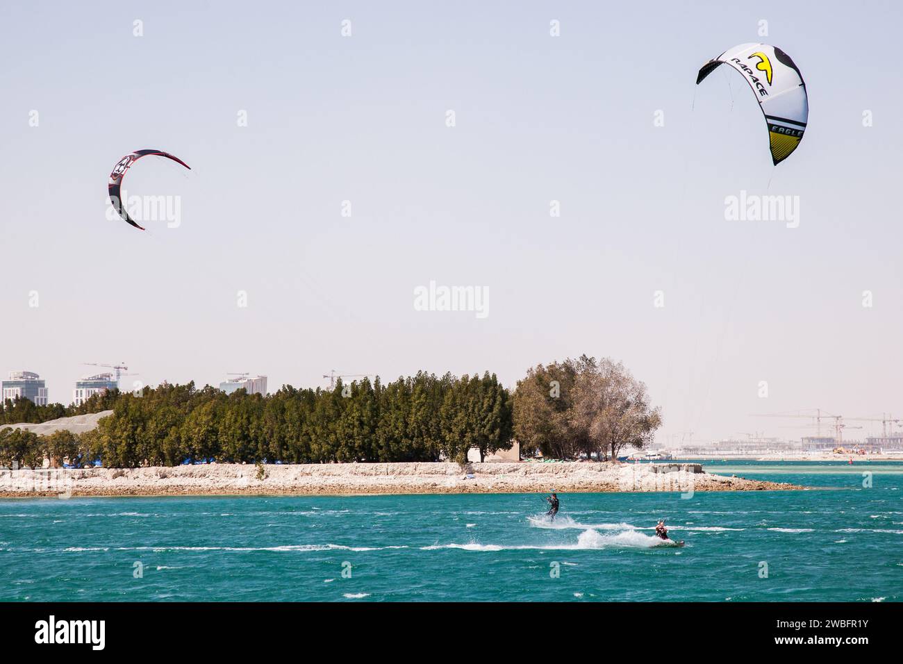 Doha, Qatar-February 14,2016 Kiteboarding on the waters of an ...