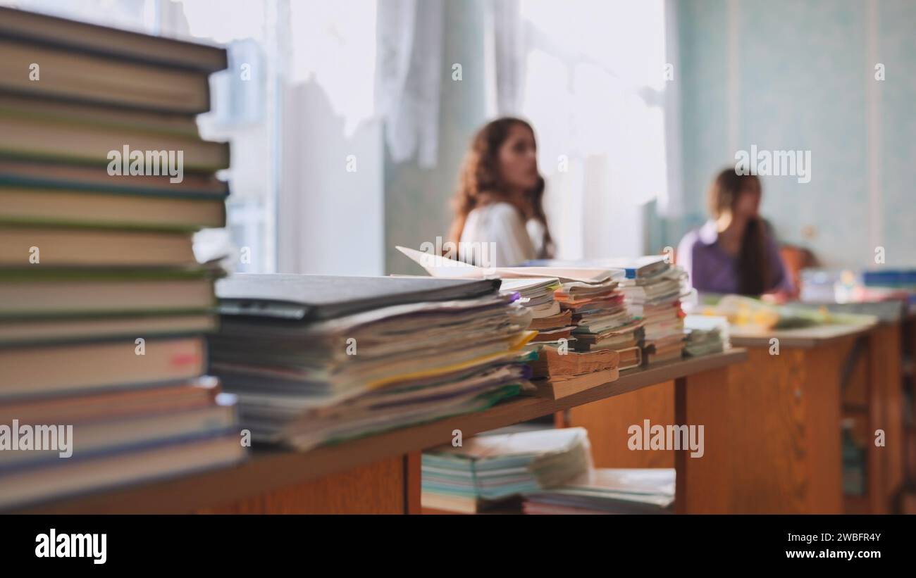 Stacks of books and notebooks in the school's teacher's lounge Stock ...
