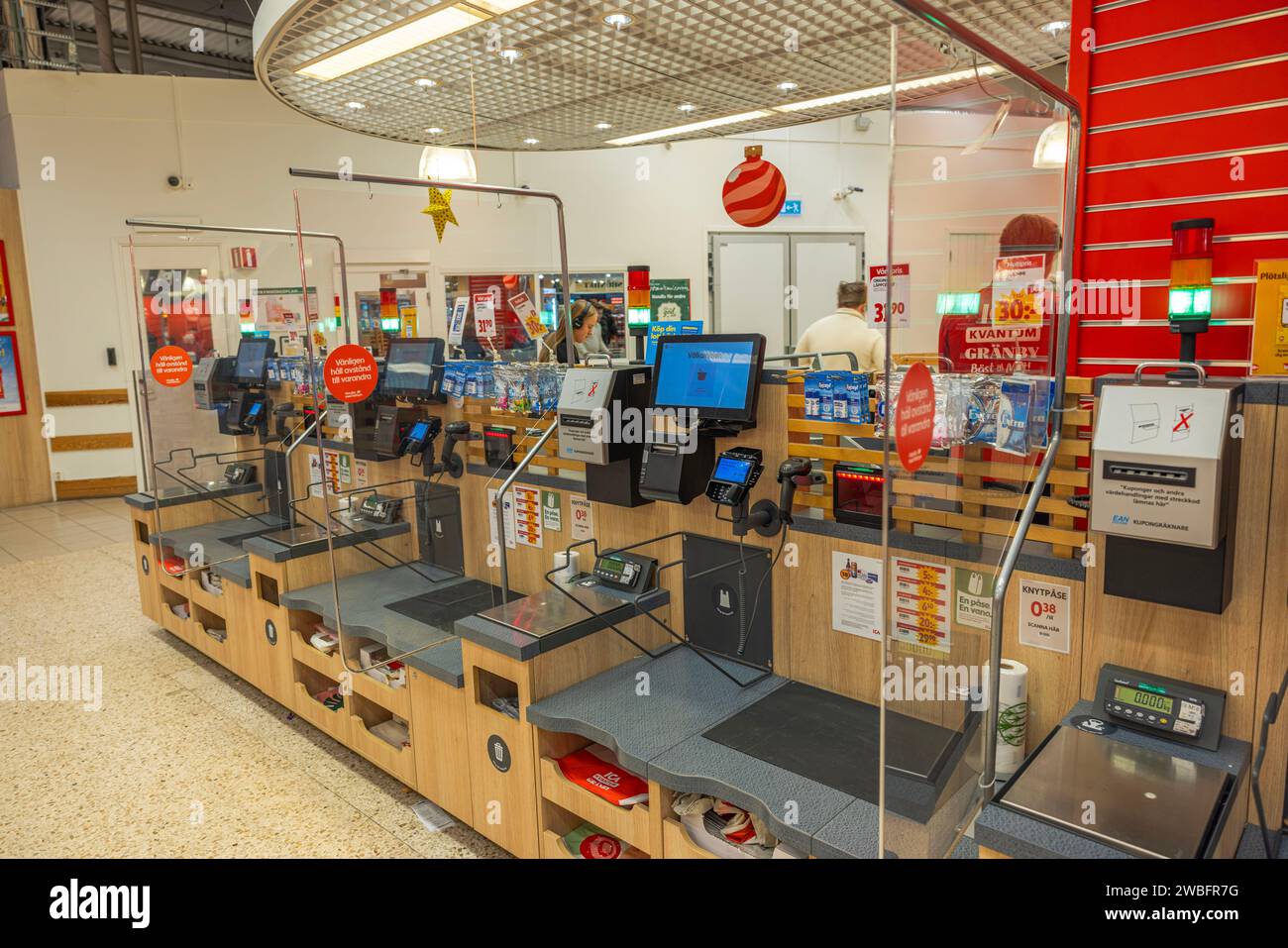 Checkout counters with self-service machines in a Swedish ICA ...