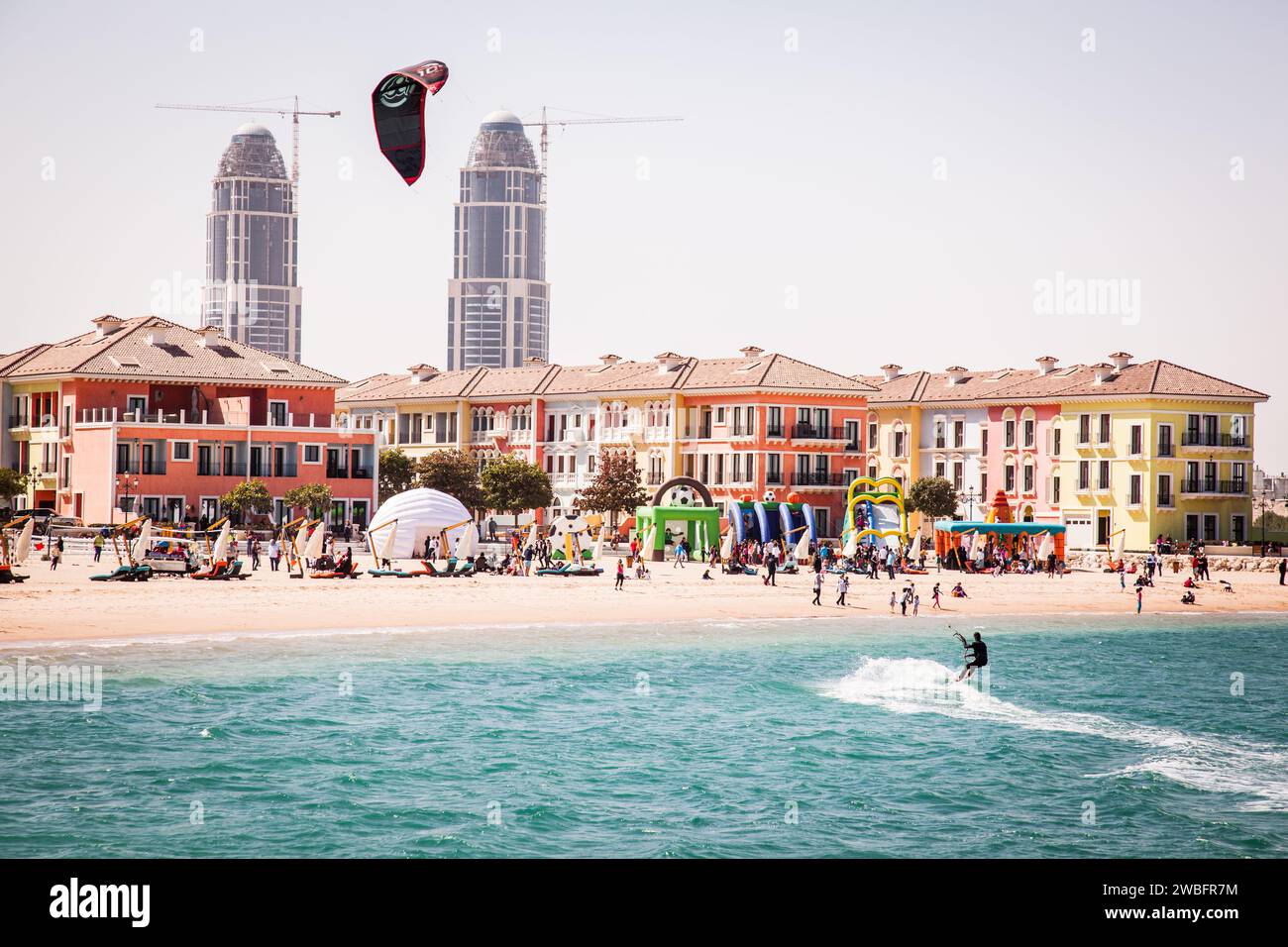 Doha, Qatar-February 14,2016 Kiteboarding on the waters of an ...