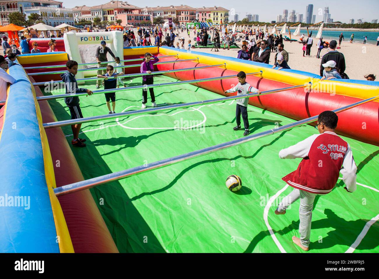Doha ,Qatar-February 14,2016 : Children play football on the occasion ...