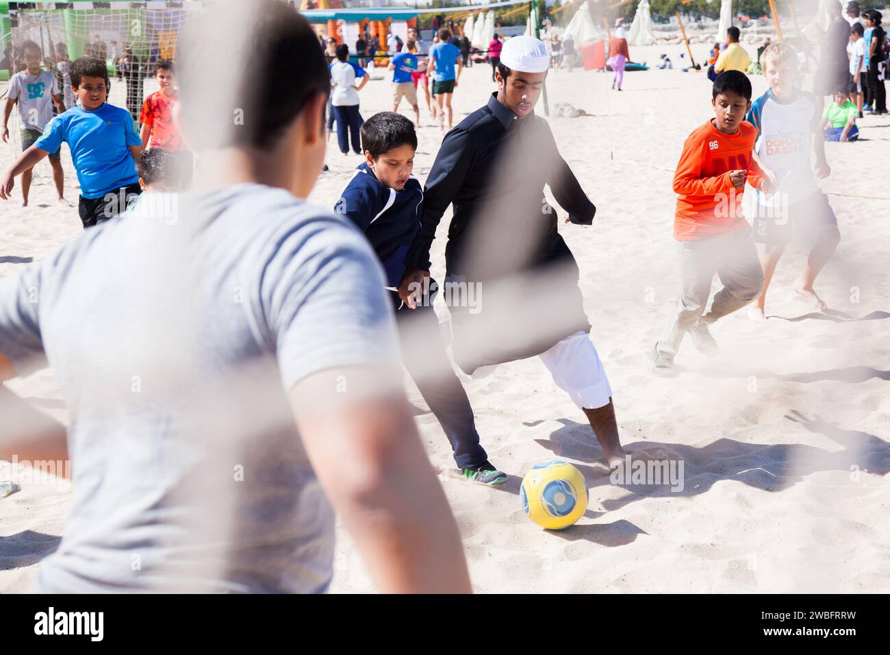Doha ,Qatar-February 14,2016 : Children play football on the occasion of the celebration of ...