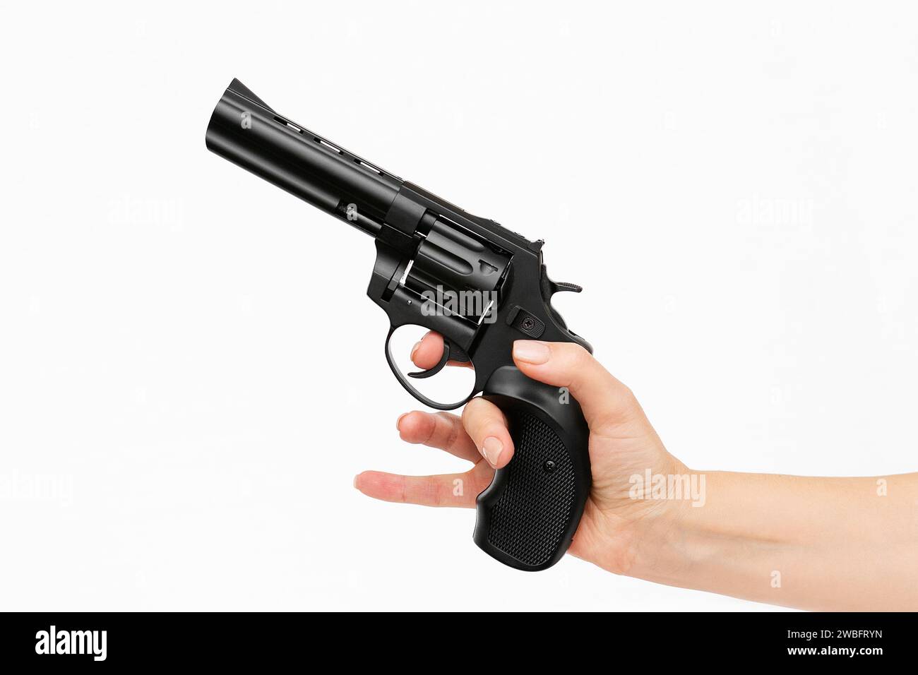 Hand holding revolver isolated hi-res stock photography and images - Alamy