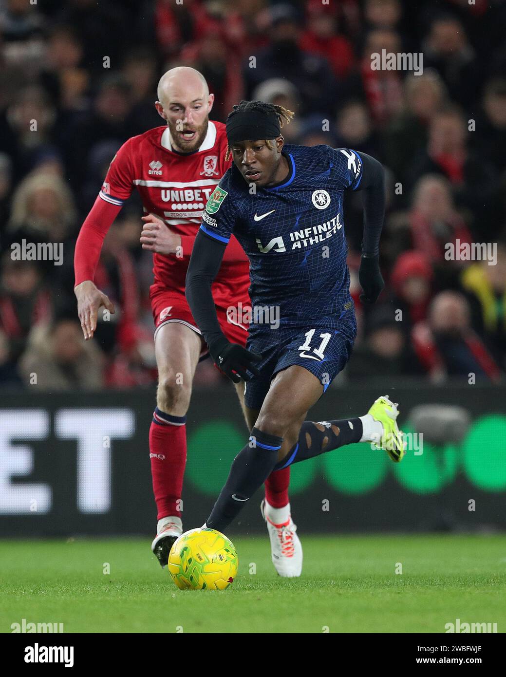 Chelsea's Noni Madueke and Middlesbrough's Matthew Clarke in action ...
