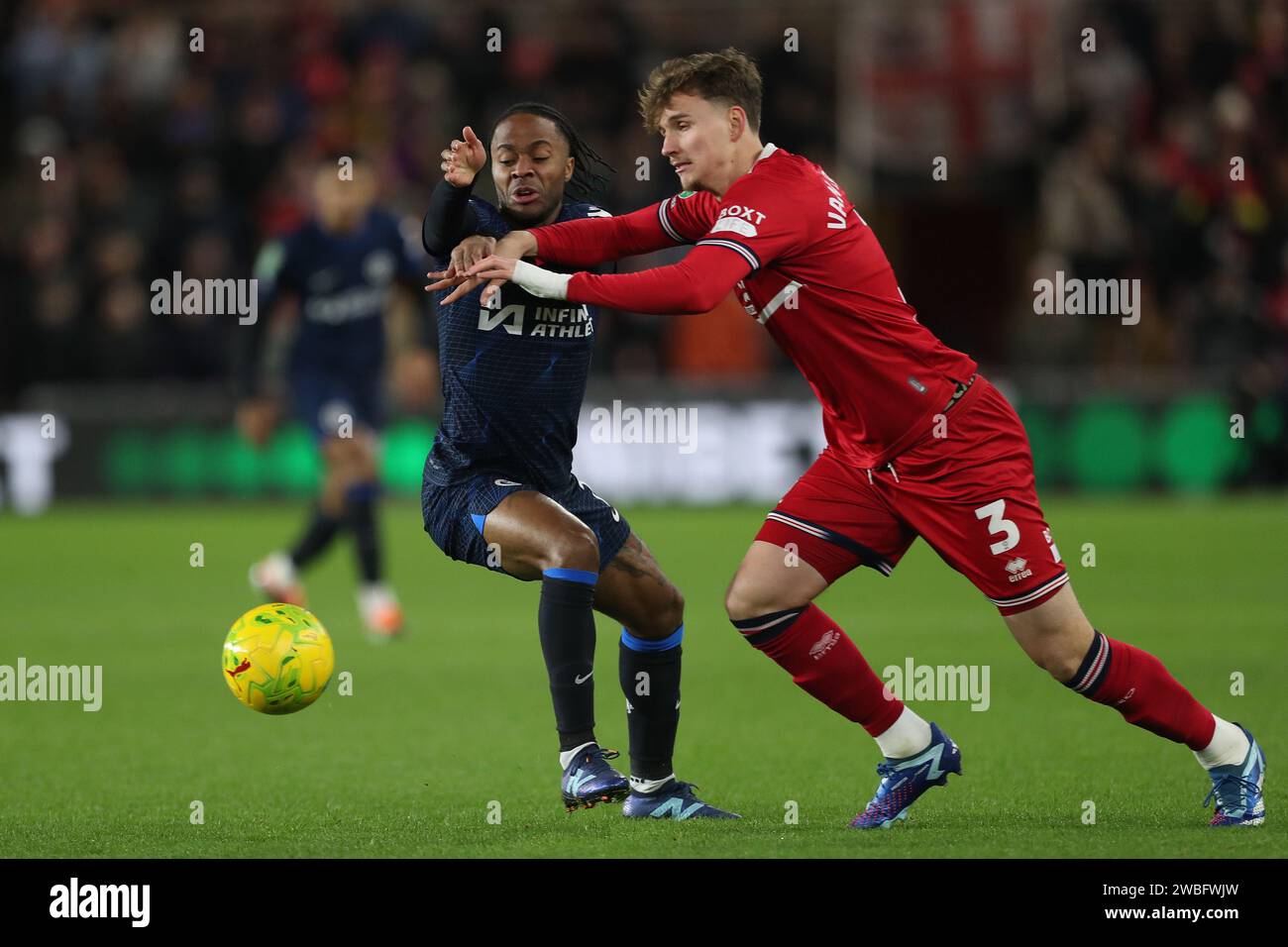Middlesbrough's Rav van den Berg battles with Chelsea's Raheem Sterling ...
