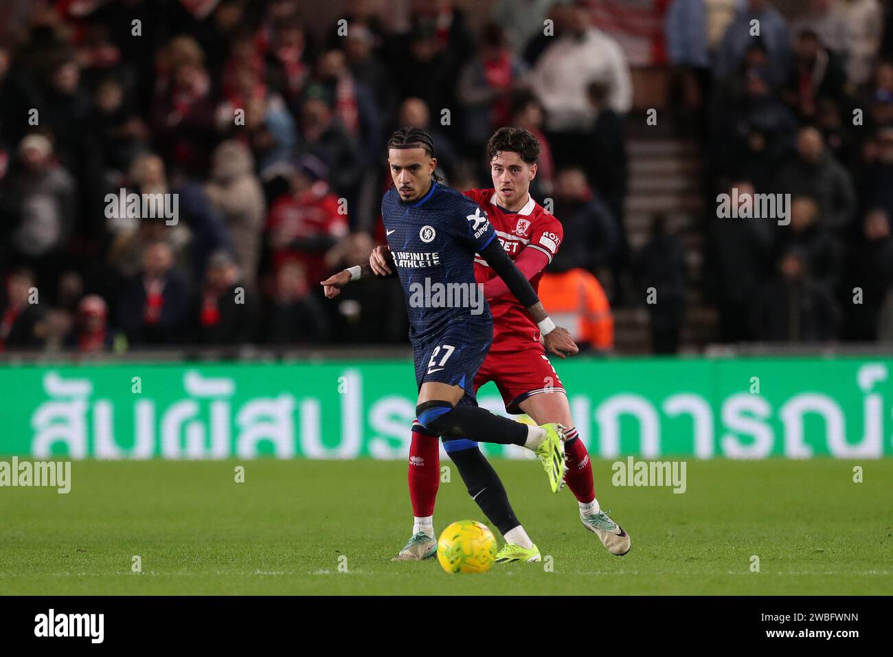 Malo Gusto of Chelsea in action with Hayden Hackney of Middlesbrough ...