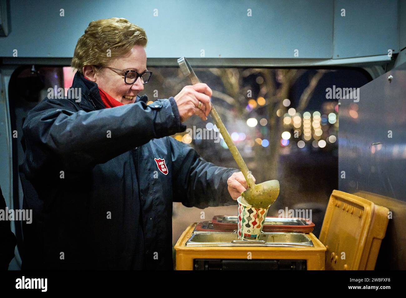 ROTTERDAM - Homeless people are offered soup from the soup bus. The ...