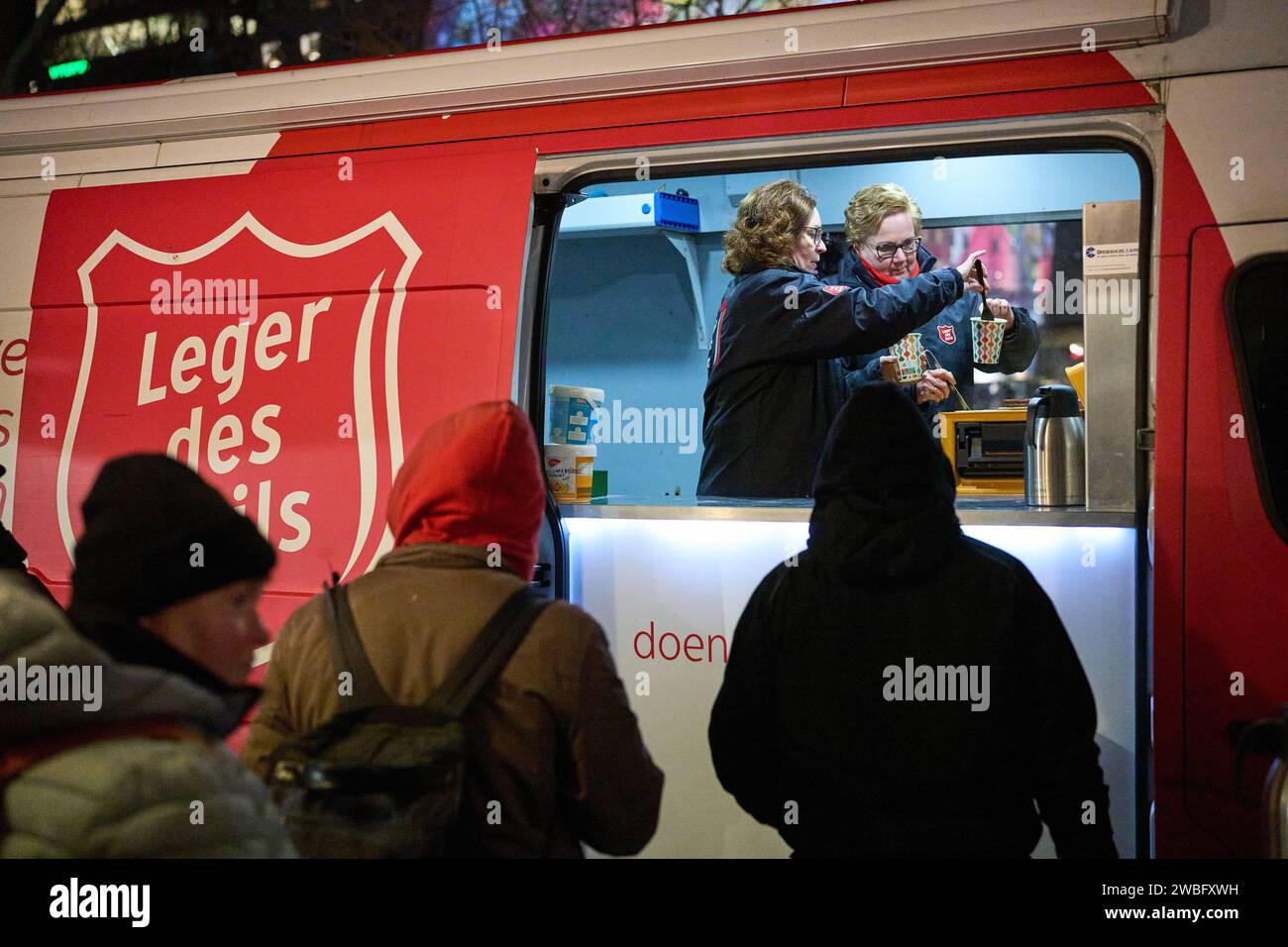 ROTTERDAM - Homeless people are offered soup from the soup bus. The ...