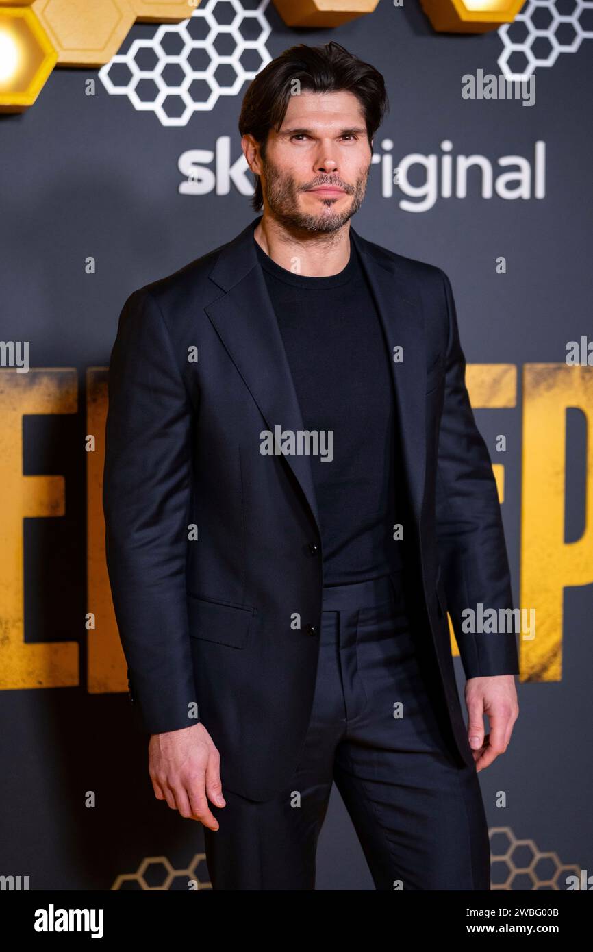 Taylor James poses for photographers upon arrival at the UK premiere of the film 'The Beekeeper ...
