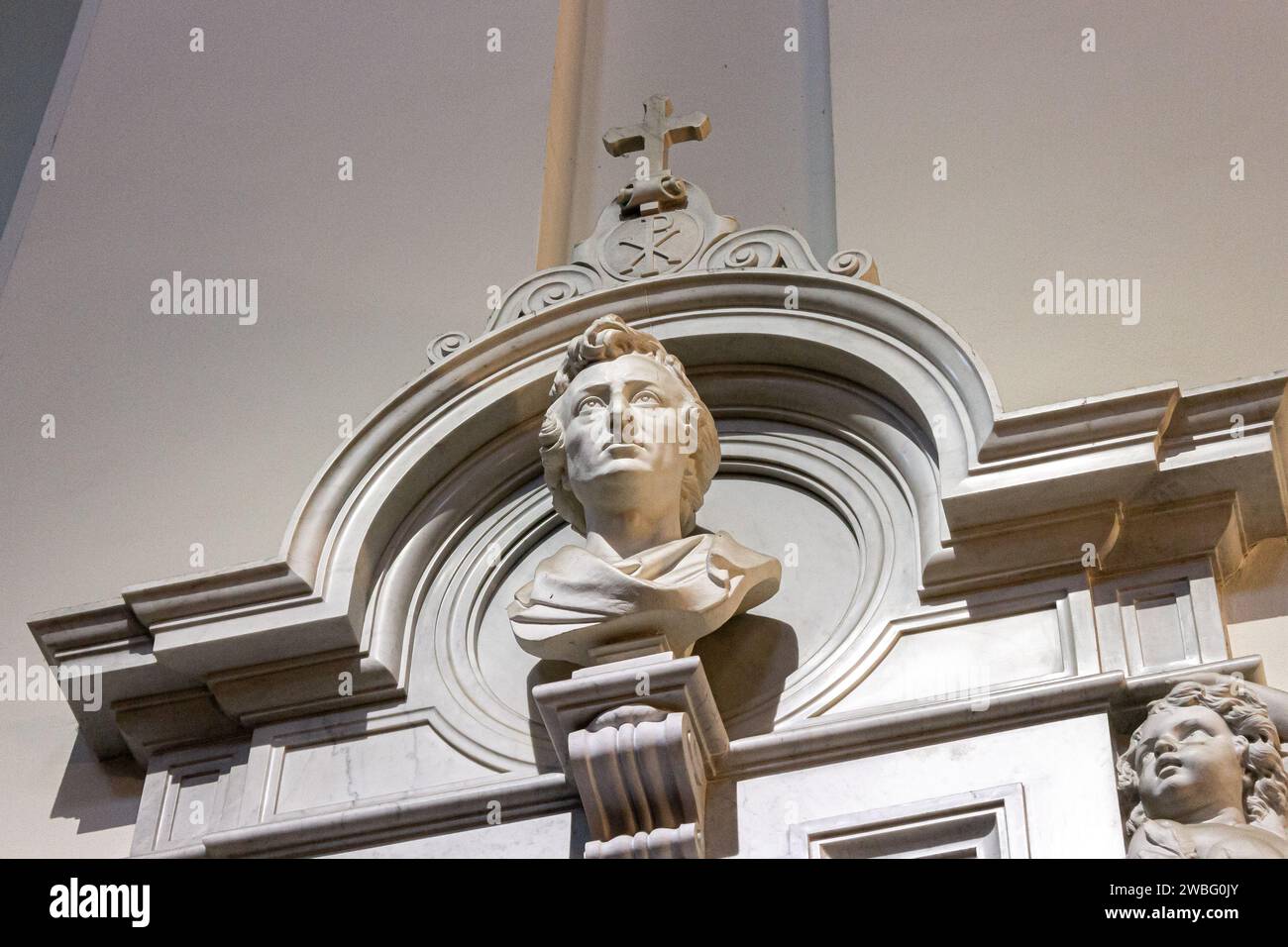 Warsaw, Poland. Funerary monument on a pillar in Holy Cross Church ...