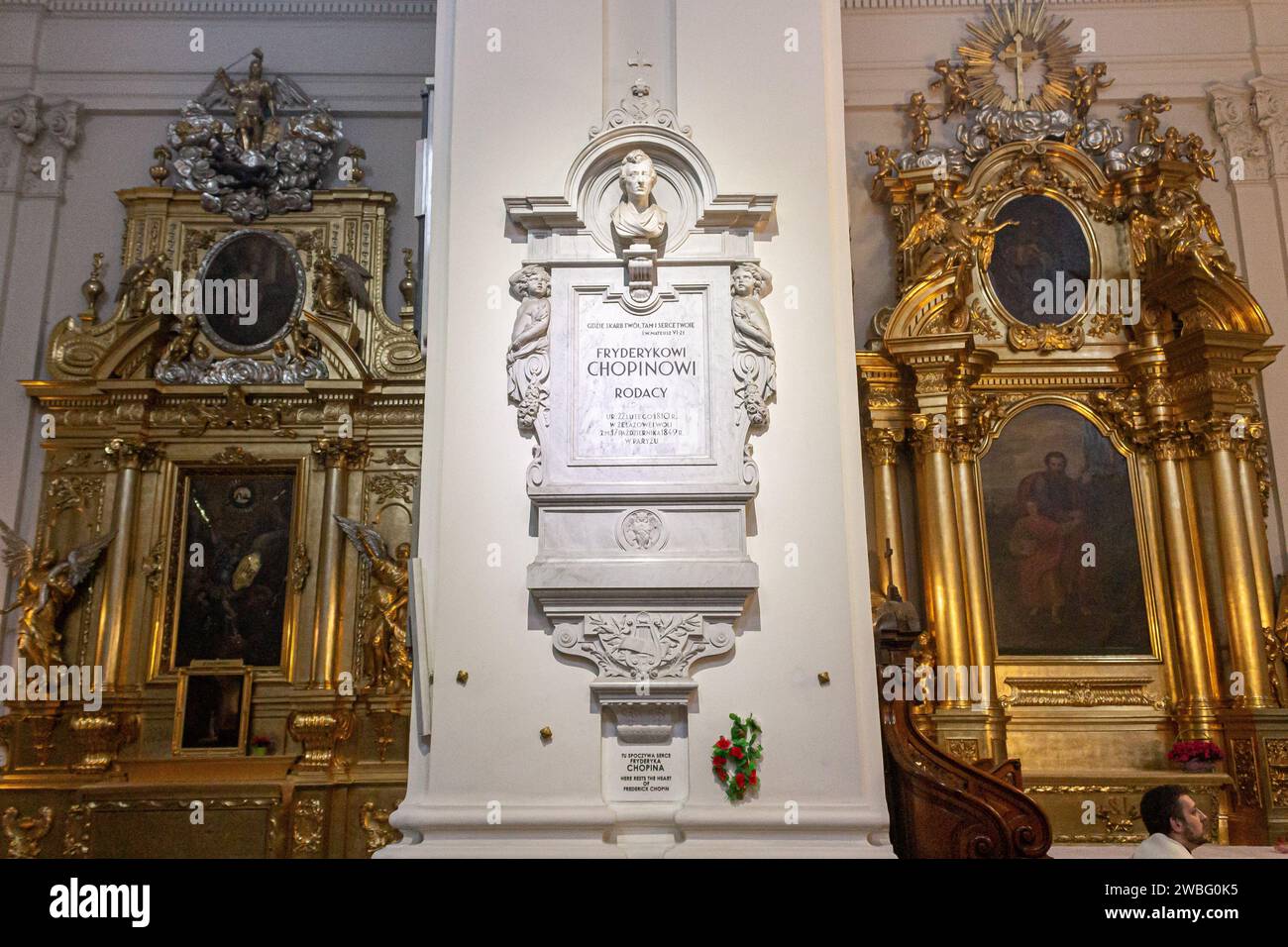 Warsaw, Poland. Funerary monument on a pillar in Holy Cross Church ...