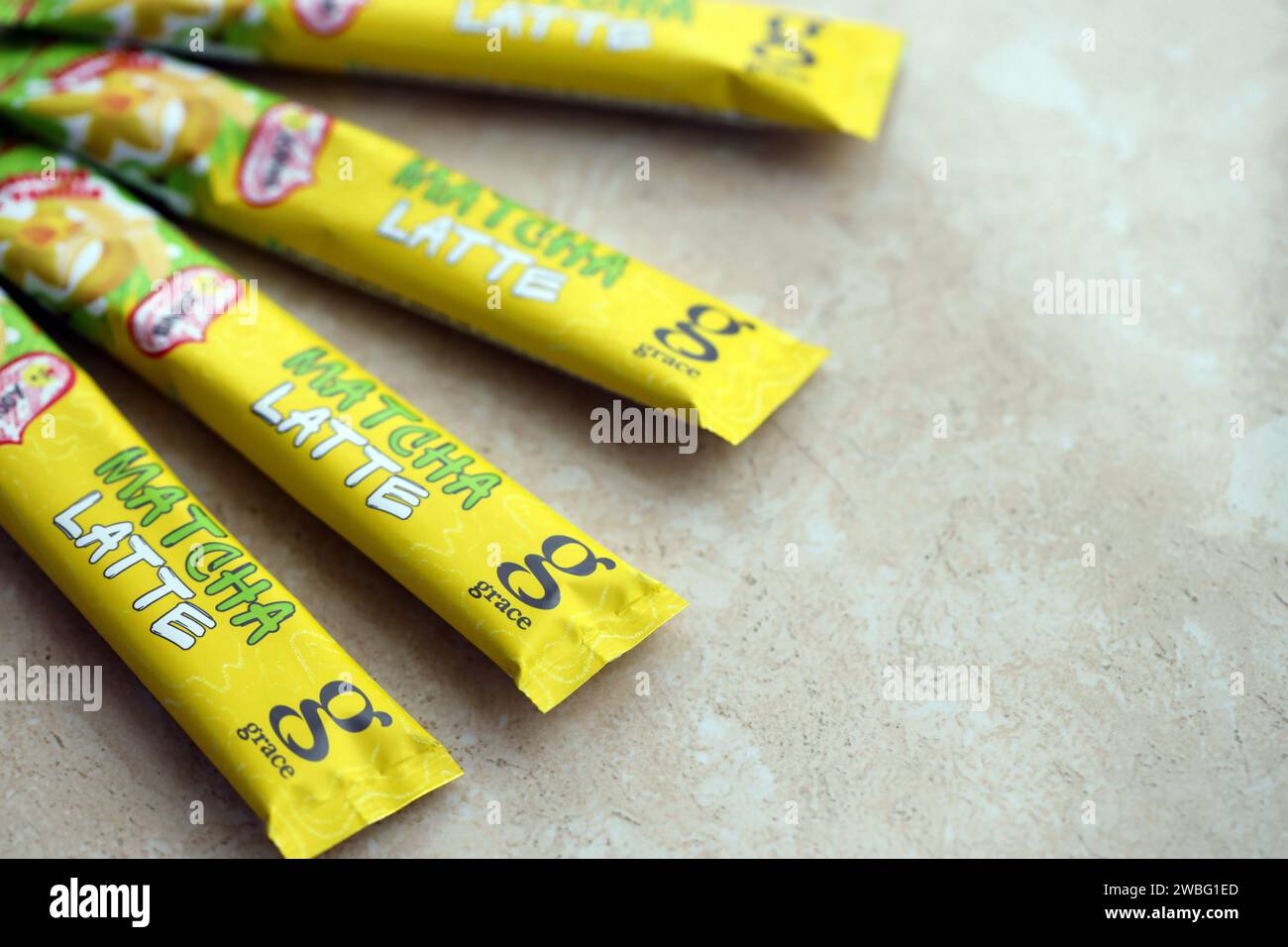 KYIV, UKRAINE - OCTOBER 31, 2023 Matcha Latte yellow sticks of green ...