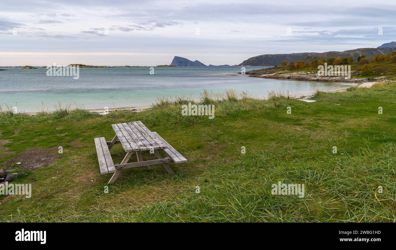 Seating area at Sommarøya beach, BBQ area on the shore of the North ...