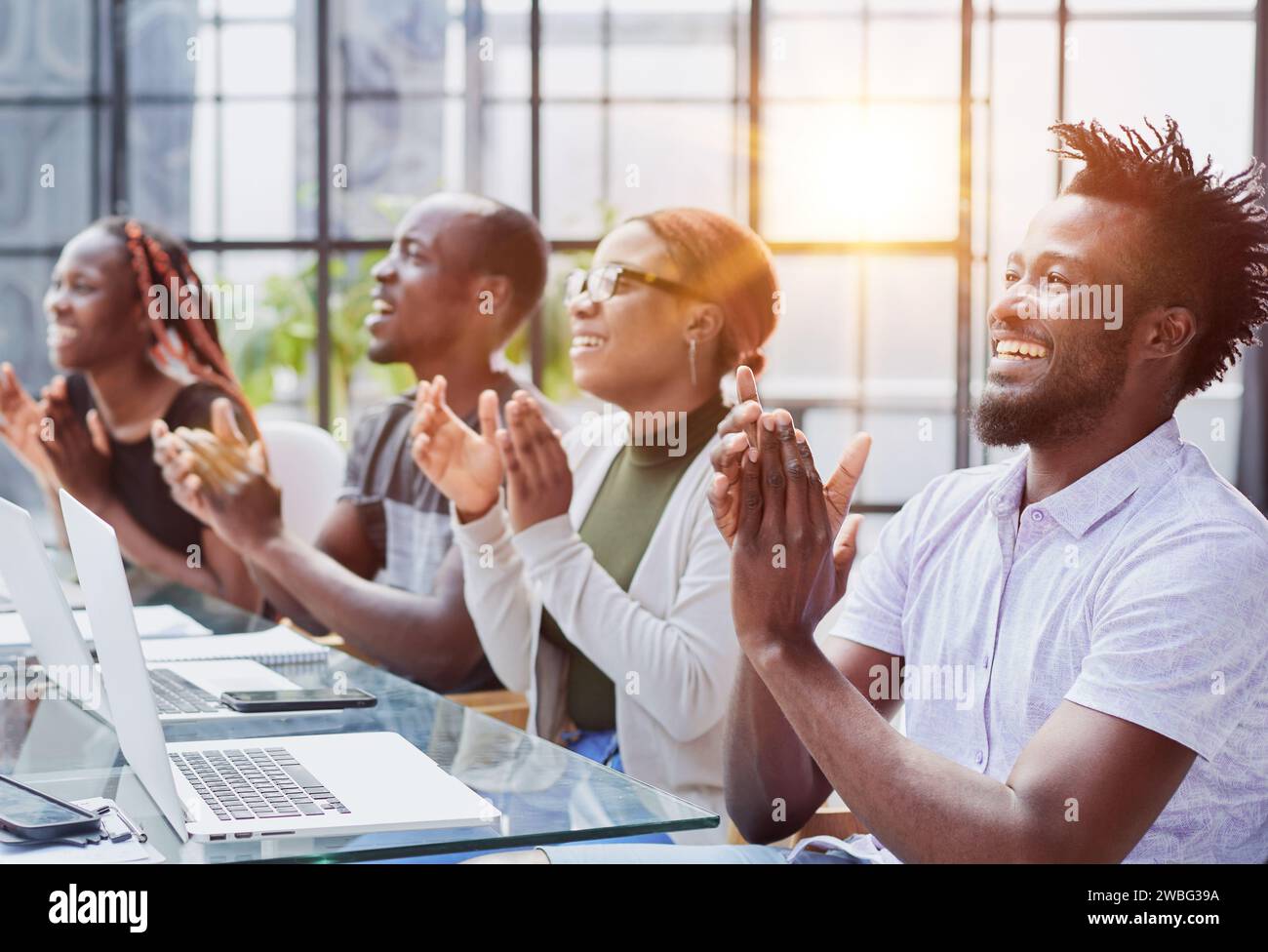 African man laptop celebrating success hi-res stock photography and ...