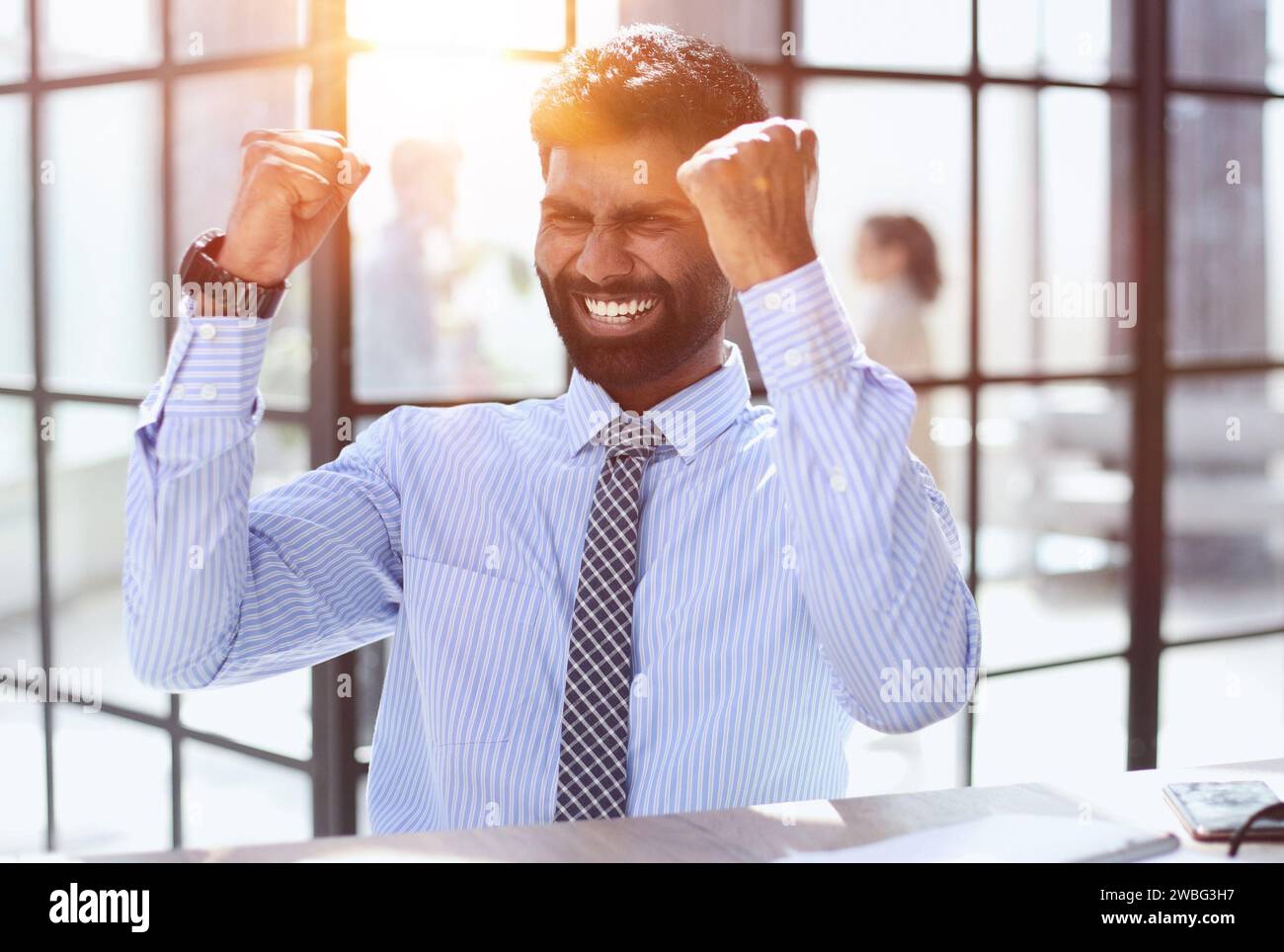 Businessman celebrating achievement man receive hi-res stock ...