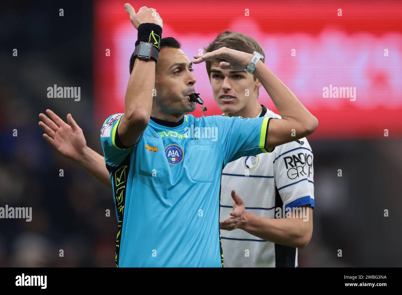 Milan, Italy. 10th Jan, 2024. The Referee Marco Di Bello calls for medics whilst Charles De ...