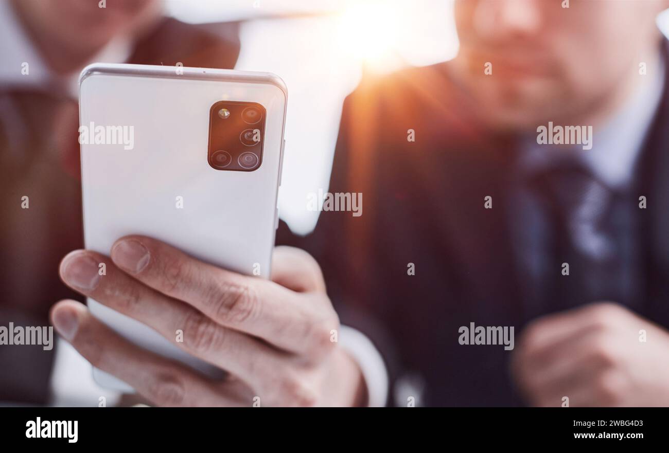 Businessman typing success on touch screen phone at AI generated ...