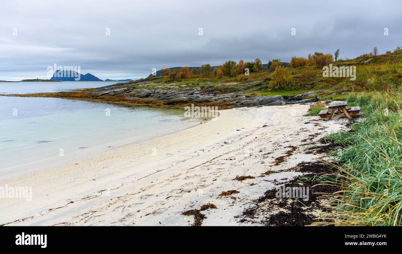 Seating area at Sommarøya beach, BBQ area on the shore of the North ...