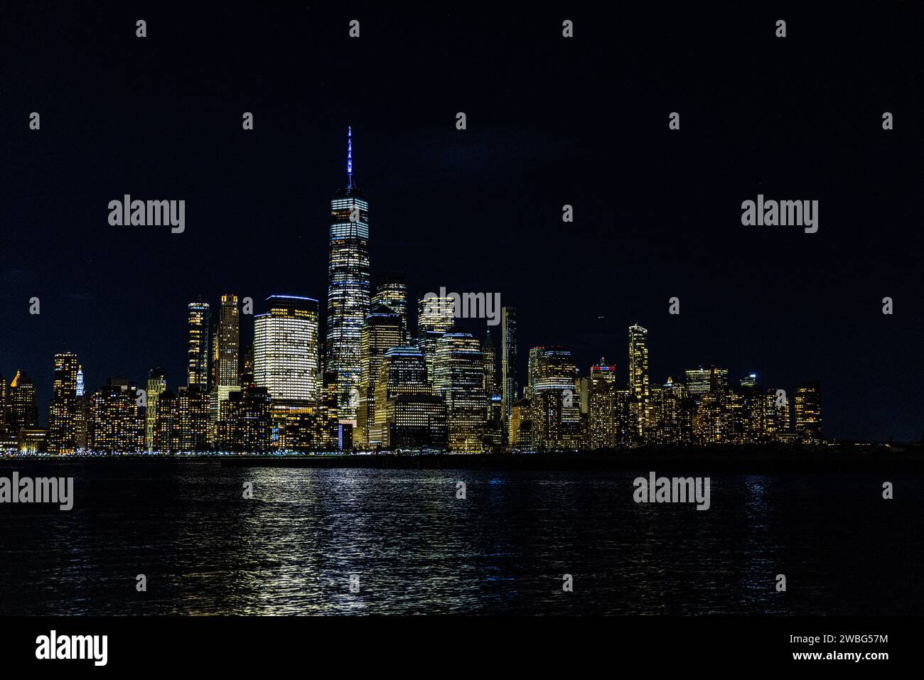 An illuminated nightscape of a vibrant urban cityscape, featuring ...