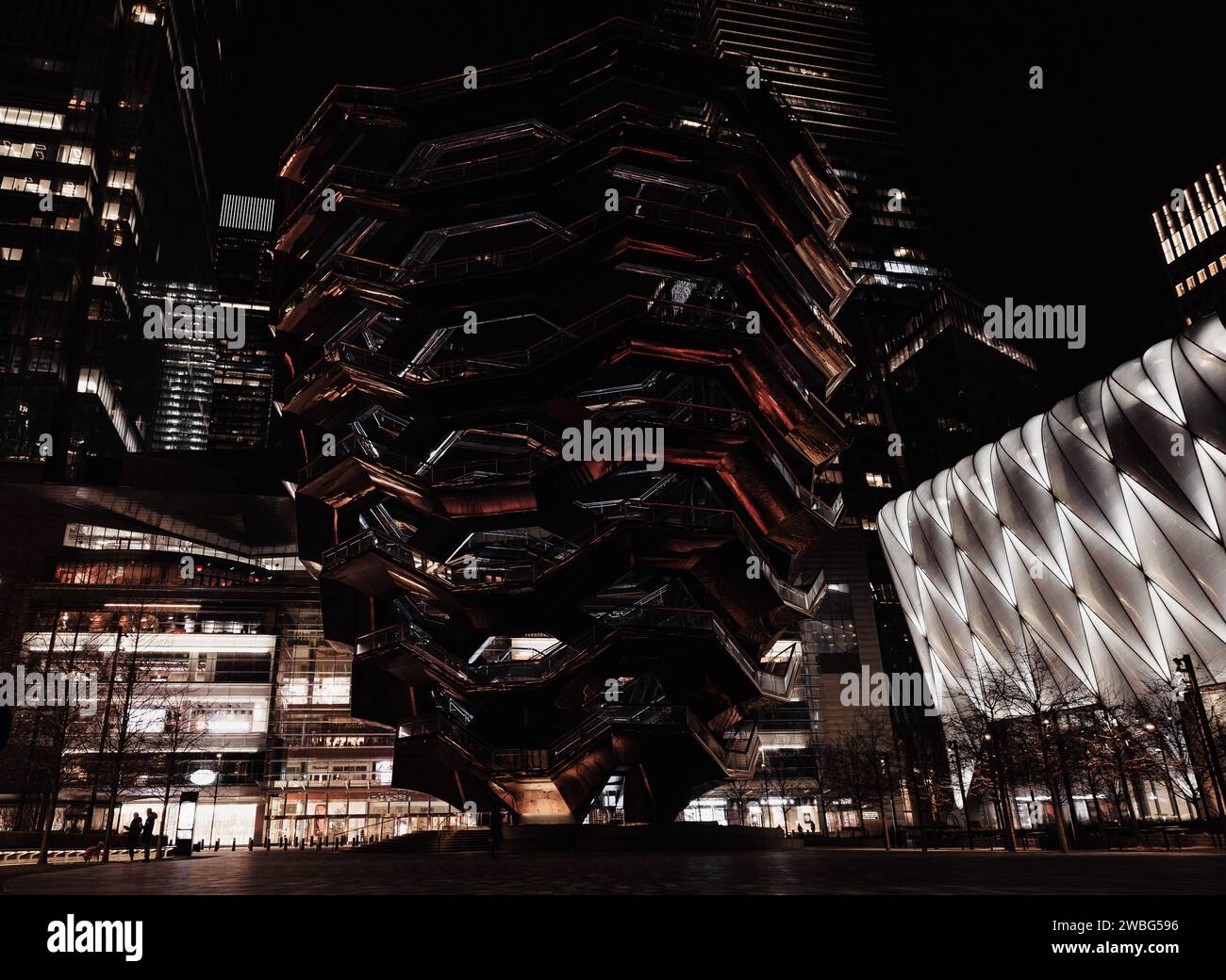 A unique structure stands tall and proud, featuring a towering facade ...