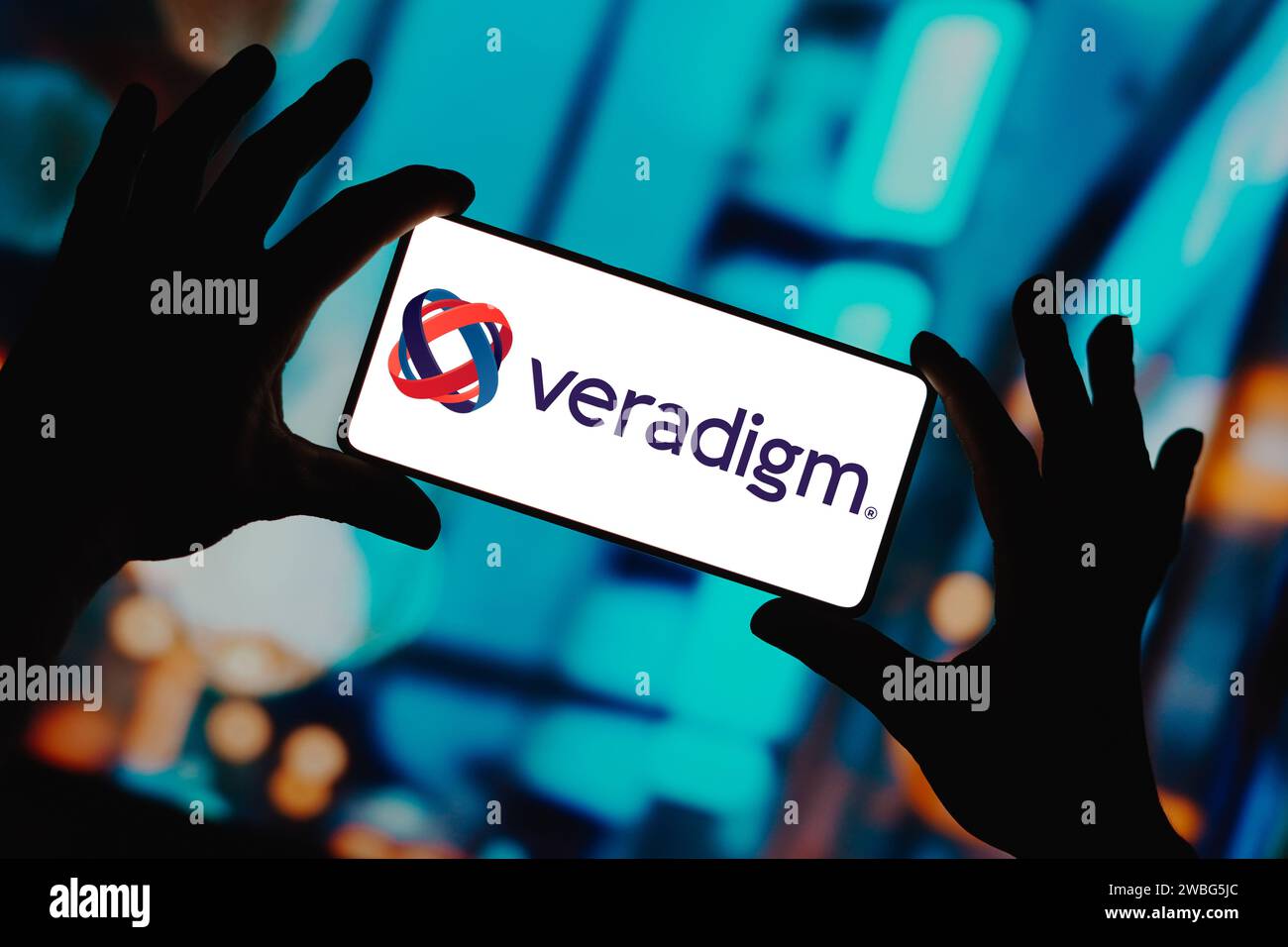In this photo illustration, the Veradigm logo is displayed on a smartphone screen Stock Photo ...
