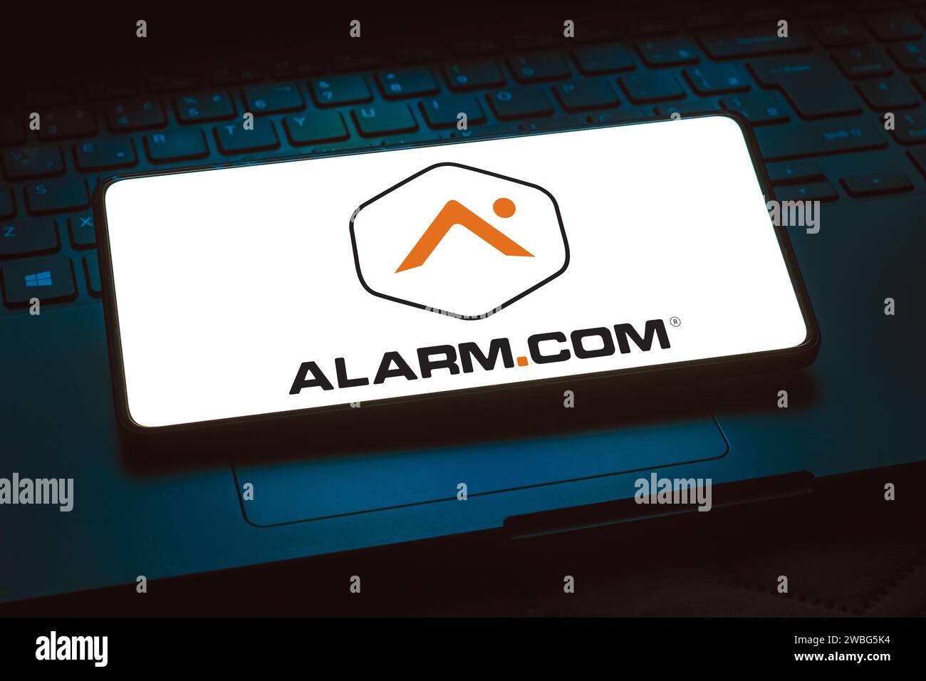 In this photo illustration, the Alarm.com, Inc. logo is displayed on a ...