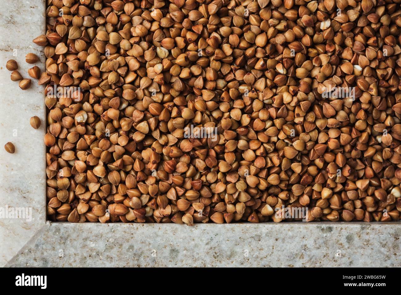 Buckwheat groats background. Raw uncooked buckwheat close-up Stock ...