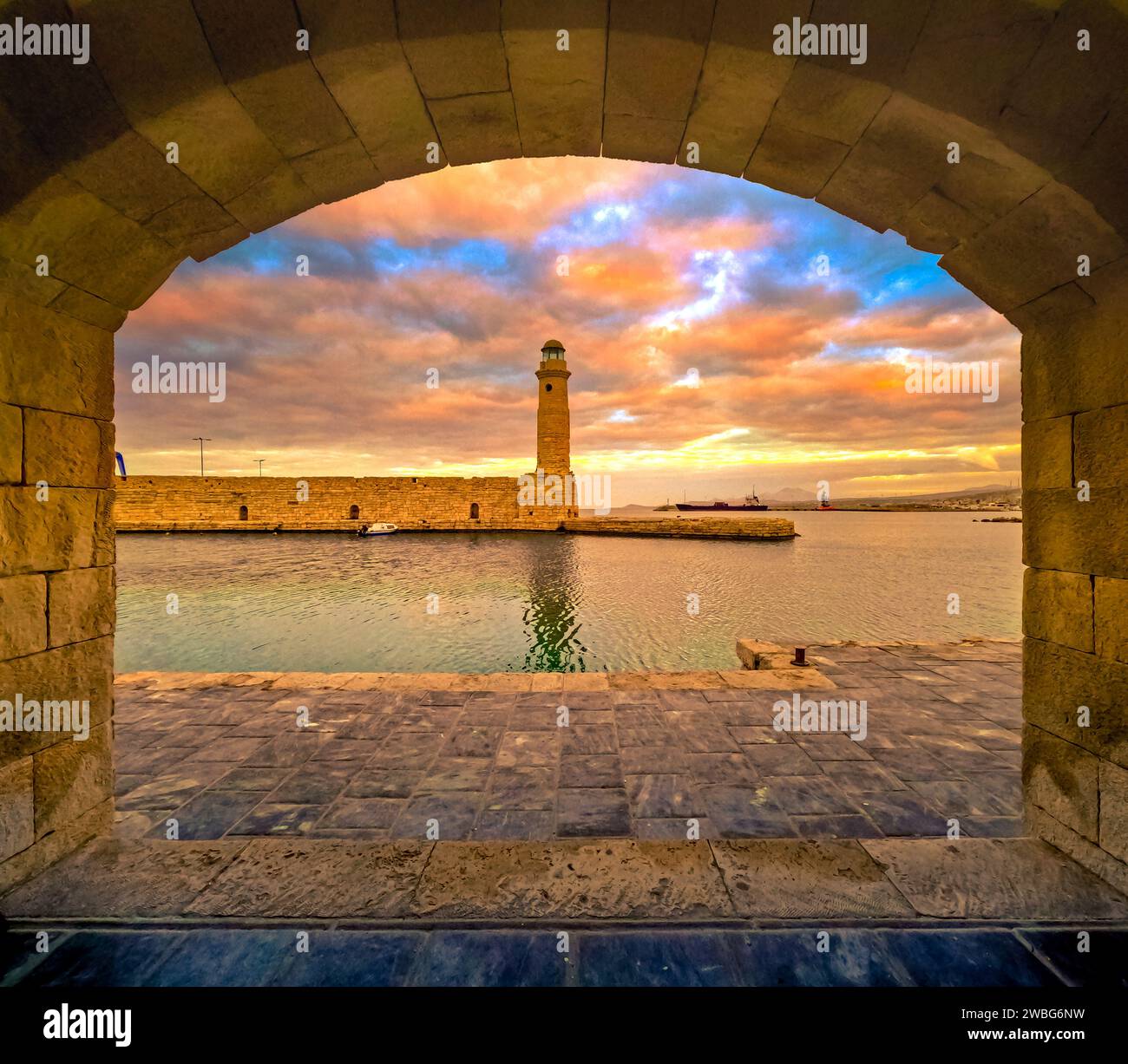 The Egyptian lighthouse at the old harbor of Rethimno through a frame ...
