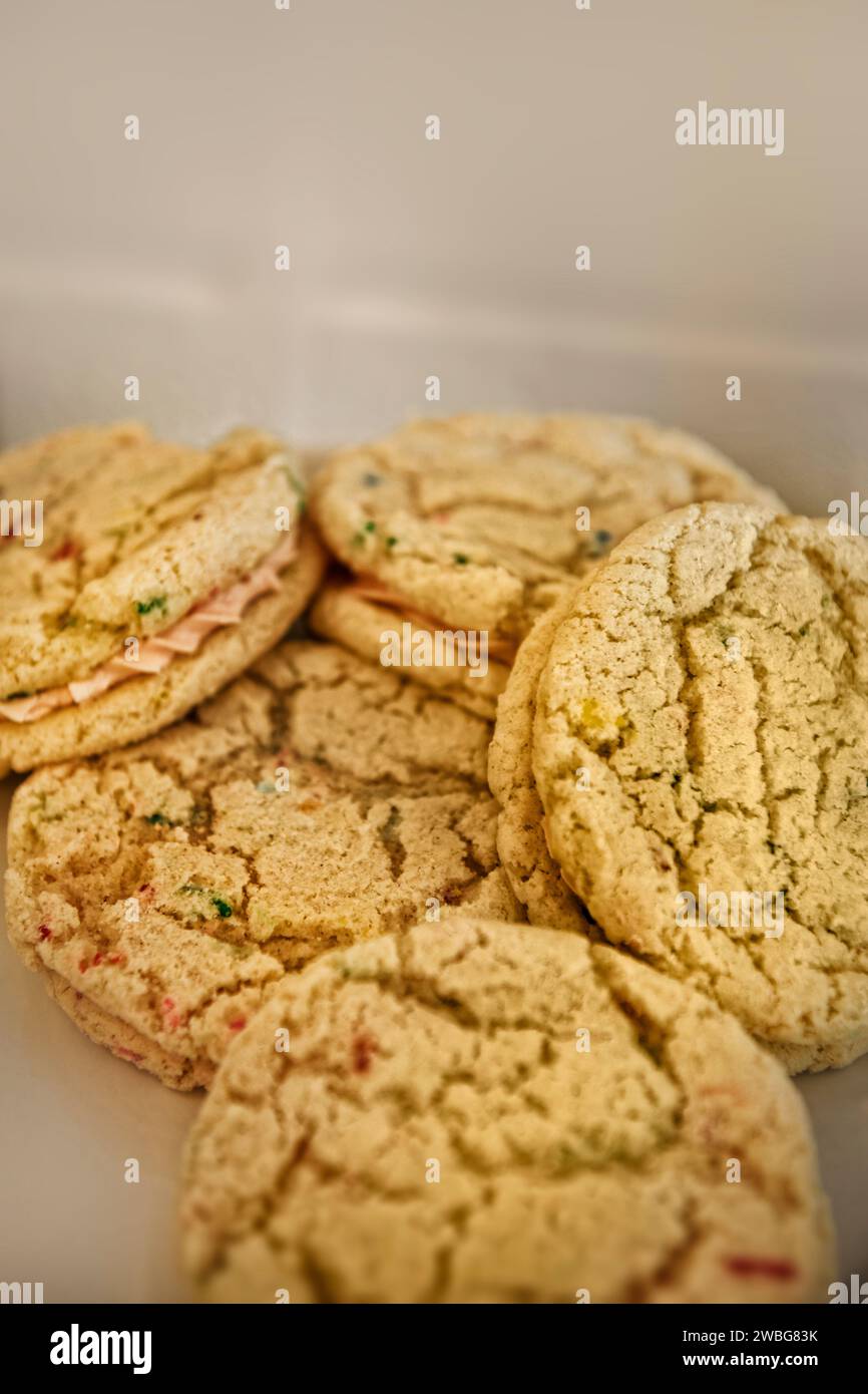 An open box of assorted cookies on a white background Stock Photo - Alamy