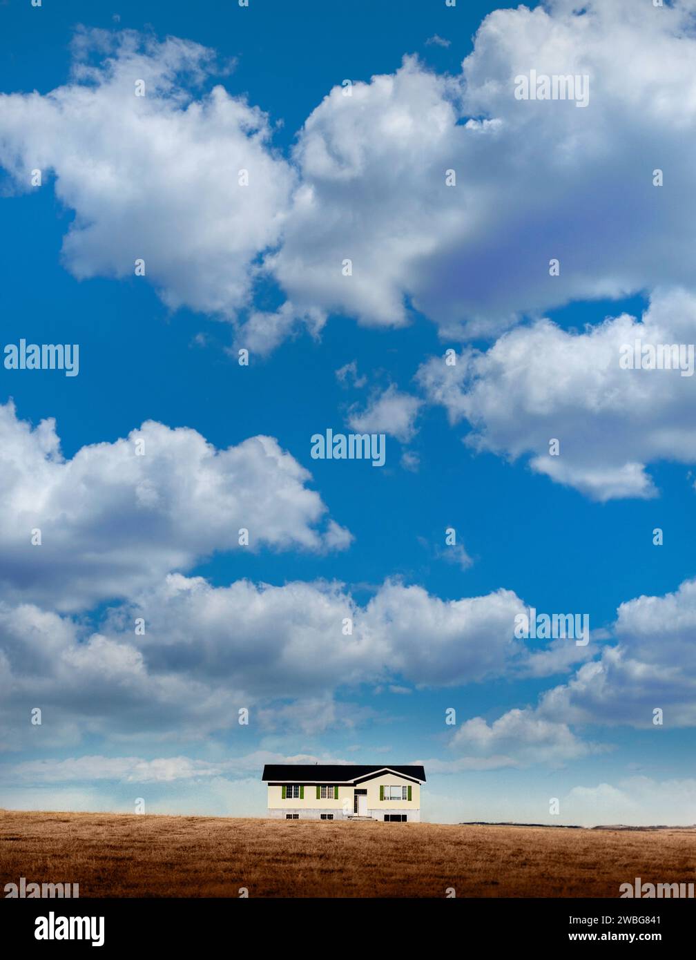 A lone house situated in a vast prairie landscape Stock Photo - Alamy