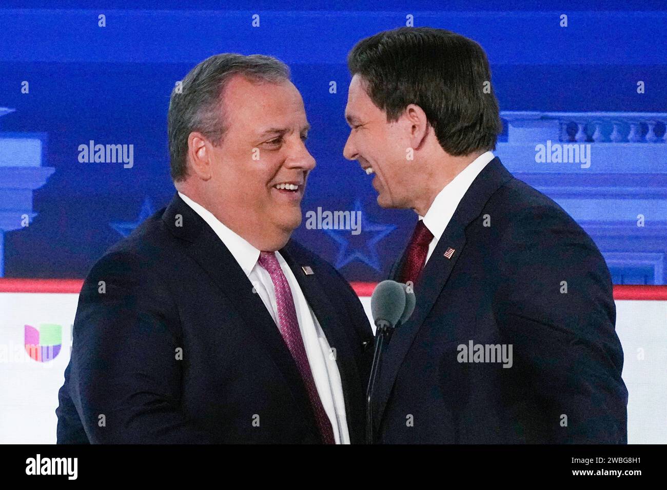 FILE - Former New Jersey Gov. Chris Christie, left, jokes with Florida ...