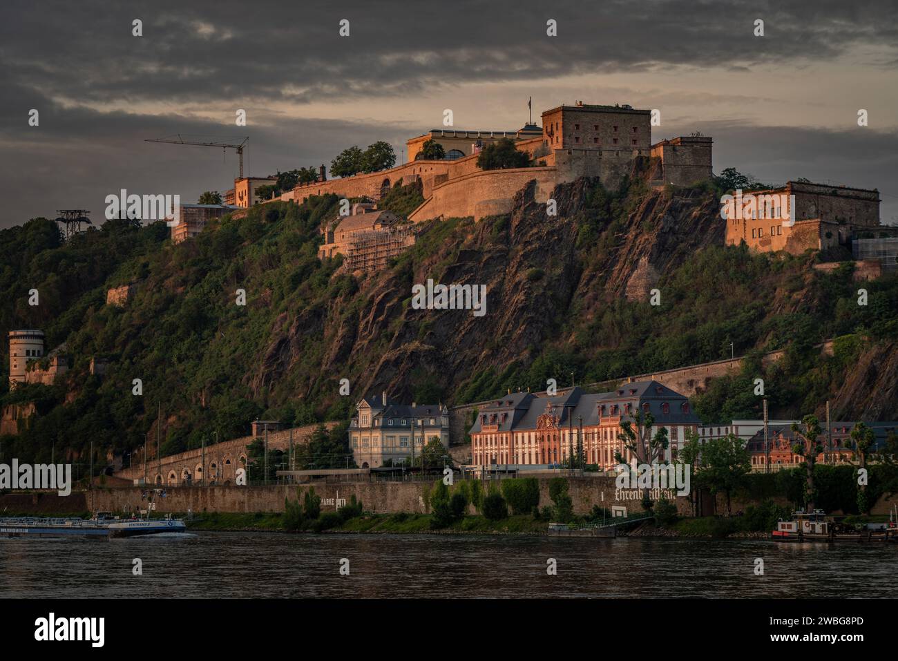 A beautiful castle stands upon a hill in the countryside, its majestic ...