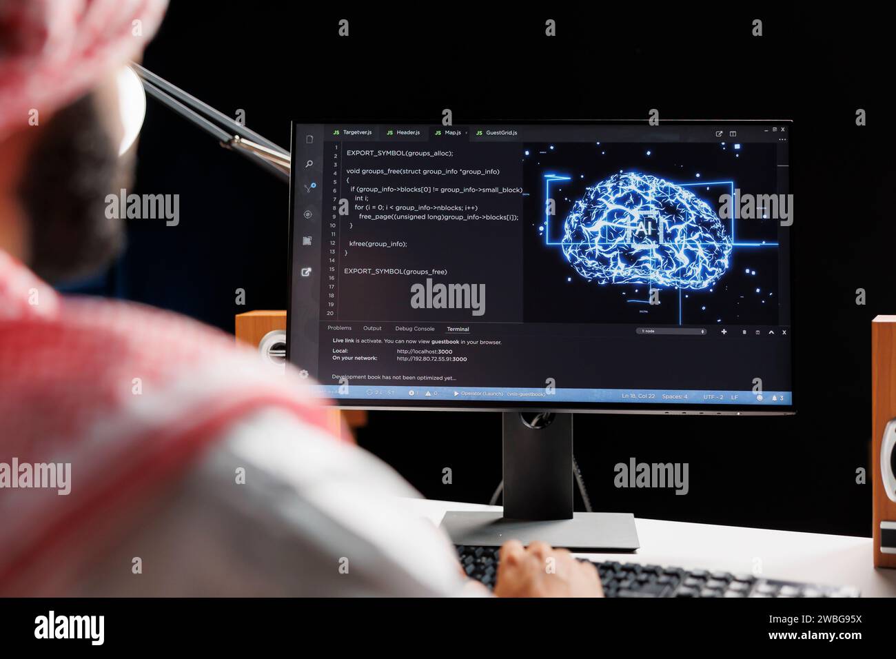 Detailed image of an Arab man using AI and machine learning, ensuring ...