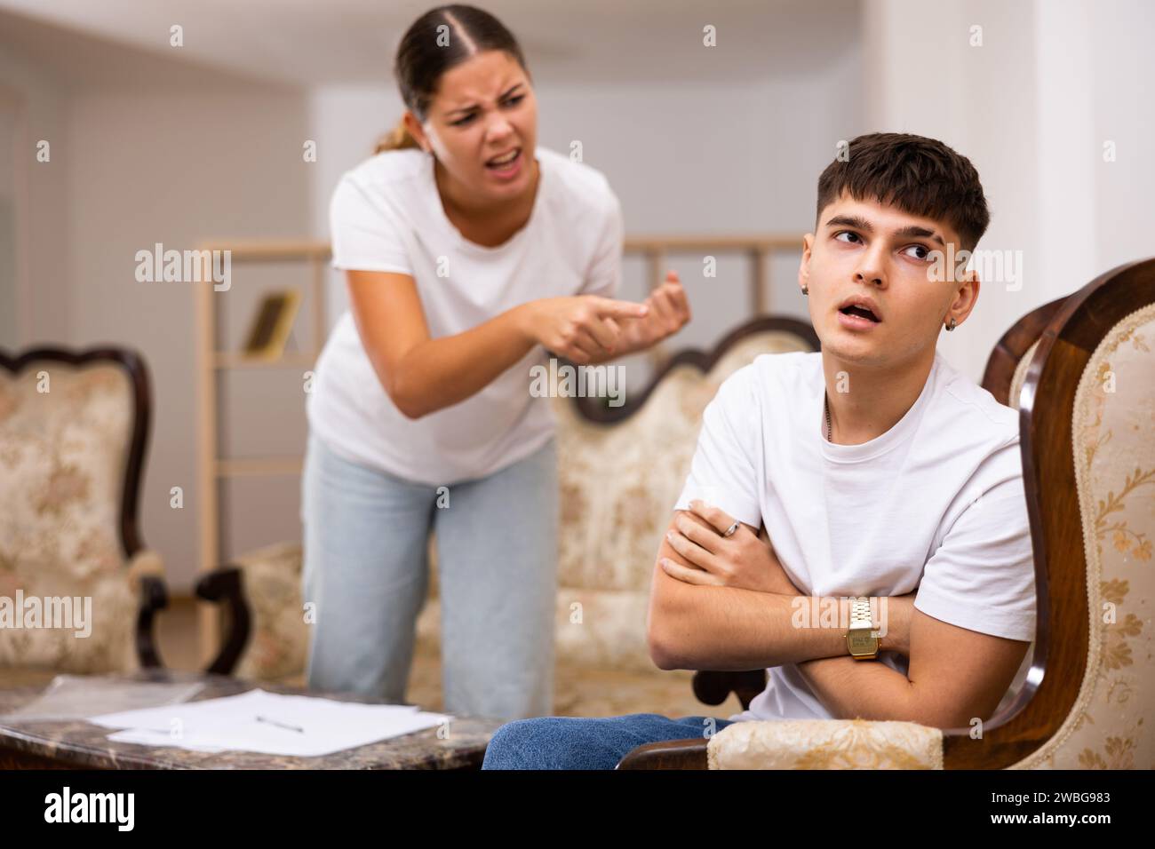 Angry young woman swears at her spouse Stock Photo - Alamy