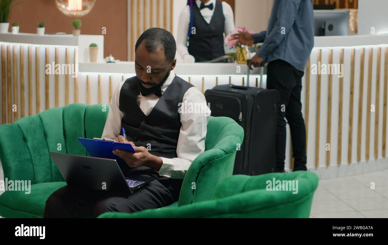 Tourism industry employee bellboy hi-res stock photography and images ...