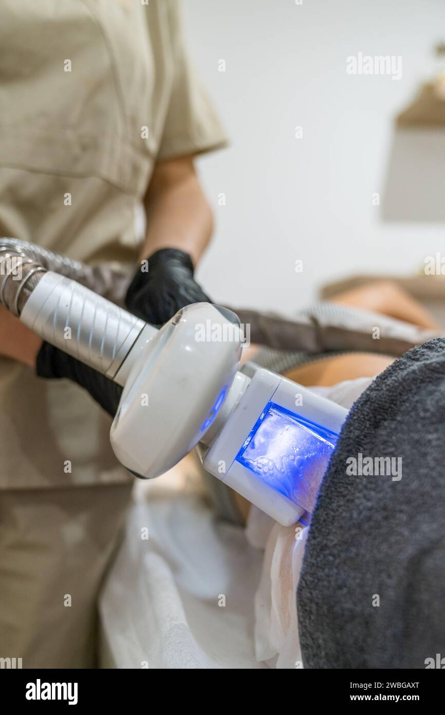 The Patient undergoing Cryolipolysis treatment, which is a technique ...