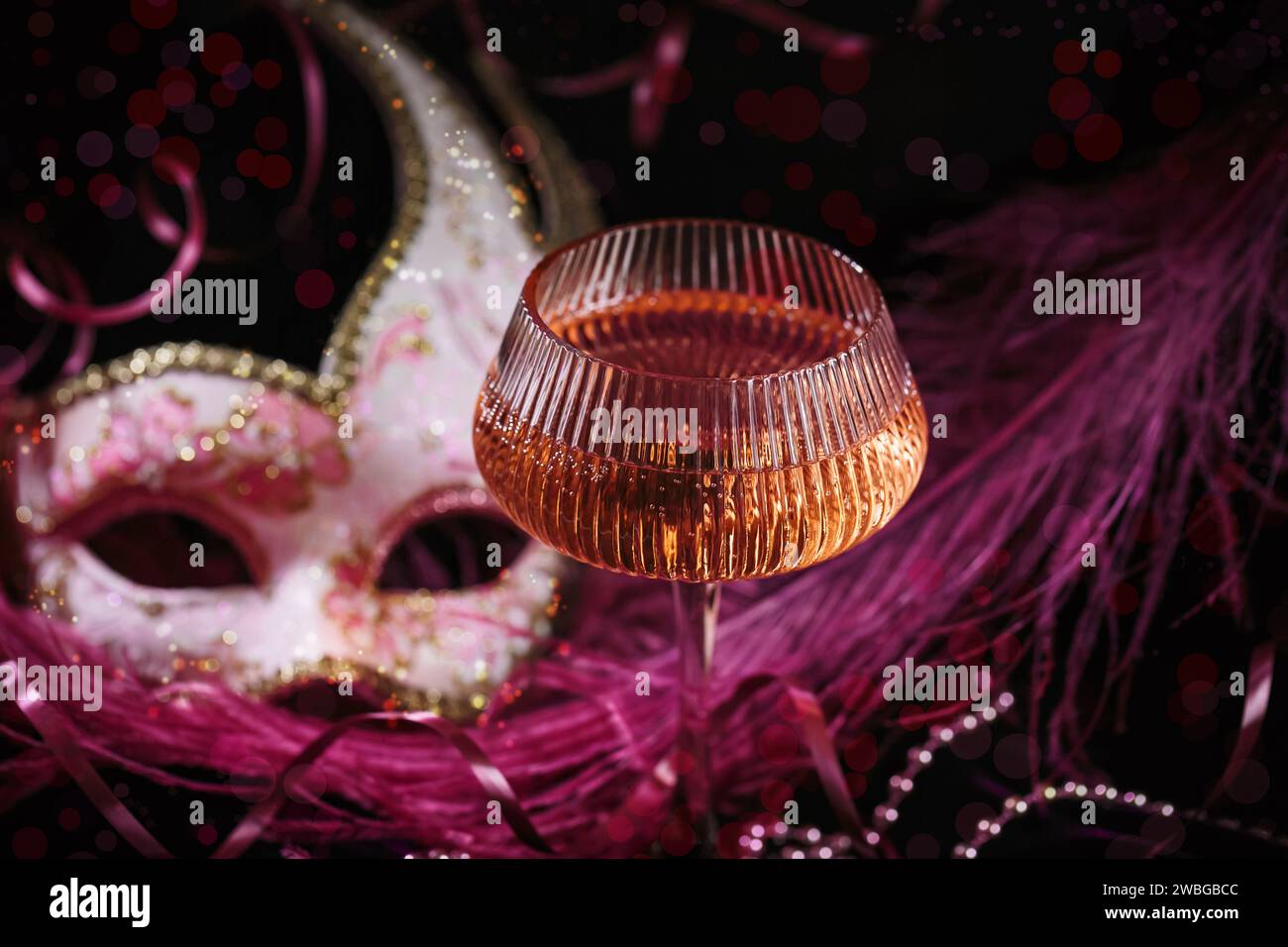 Masquerade ball holiday background with sparkling wine Stock Photo - Alamy