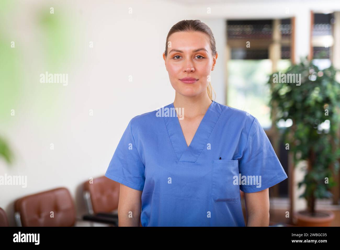 Female doctor assistant standing in medical office Stock Photo - Alamy