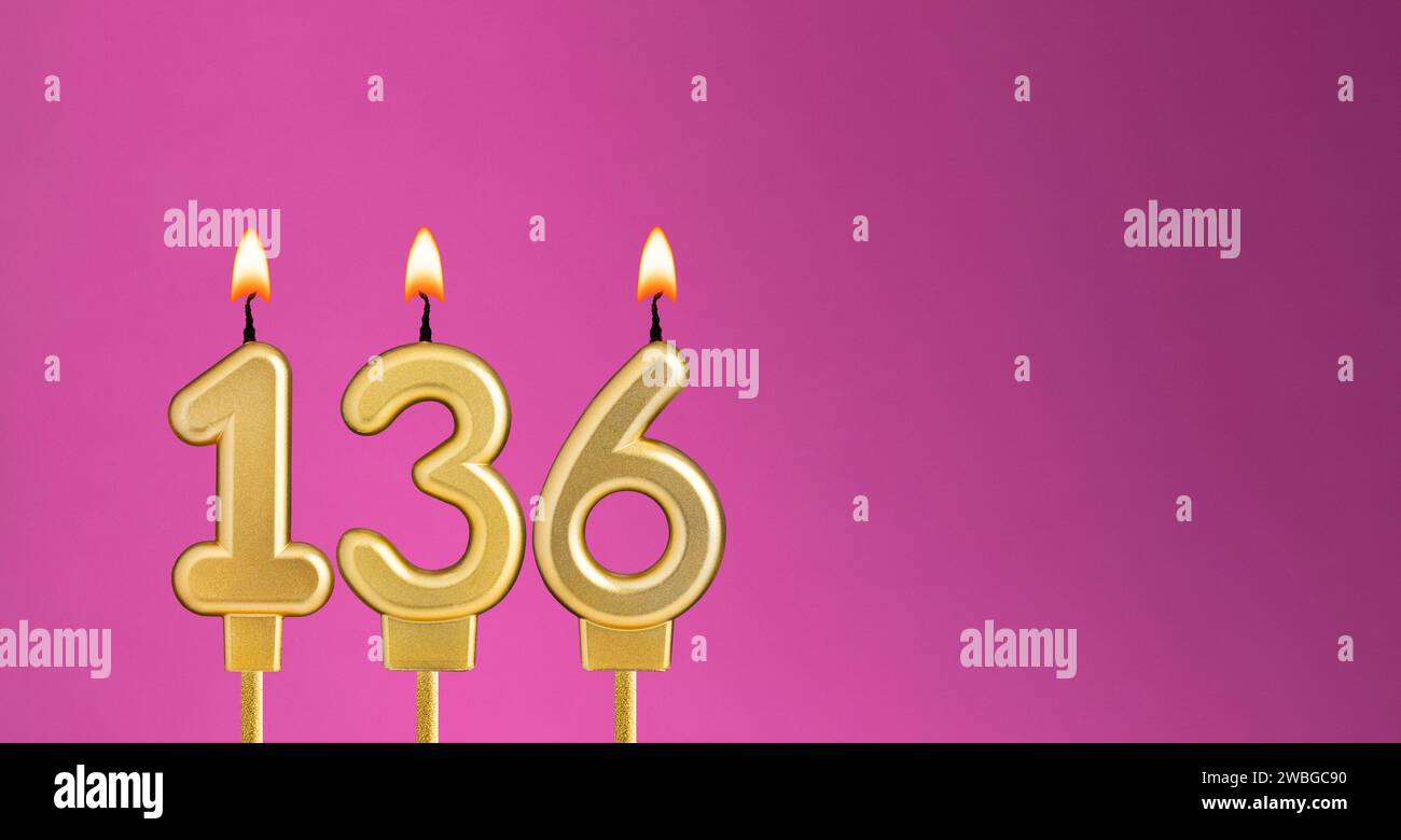 Candle number 136 in purple background - birthday card Stock Photo - Alamy