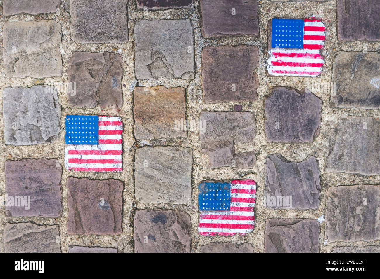 Cable stones painted with the American flag in Carentan France Stock ...