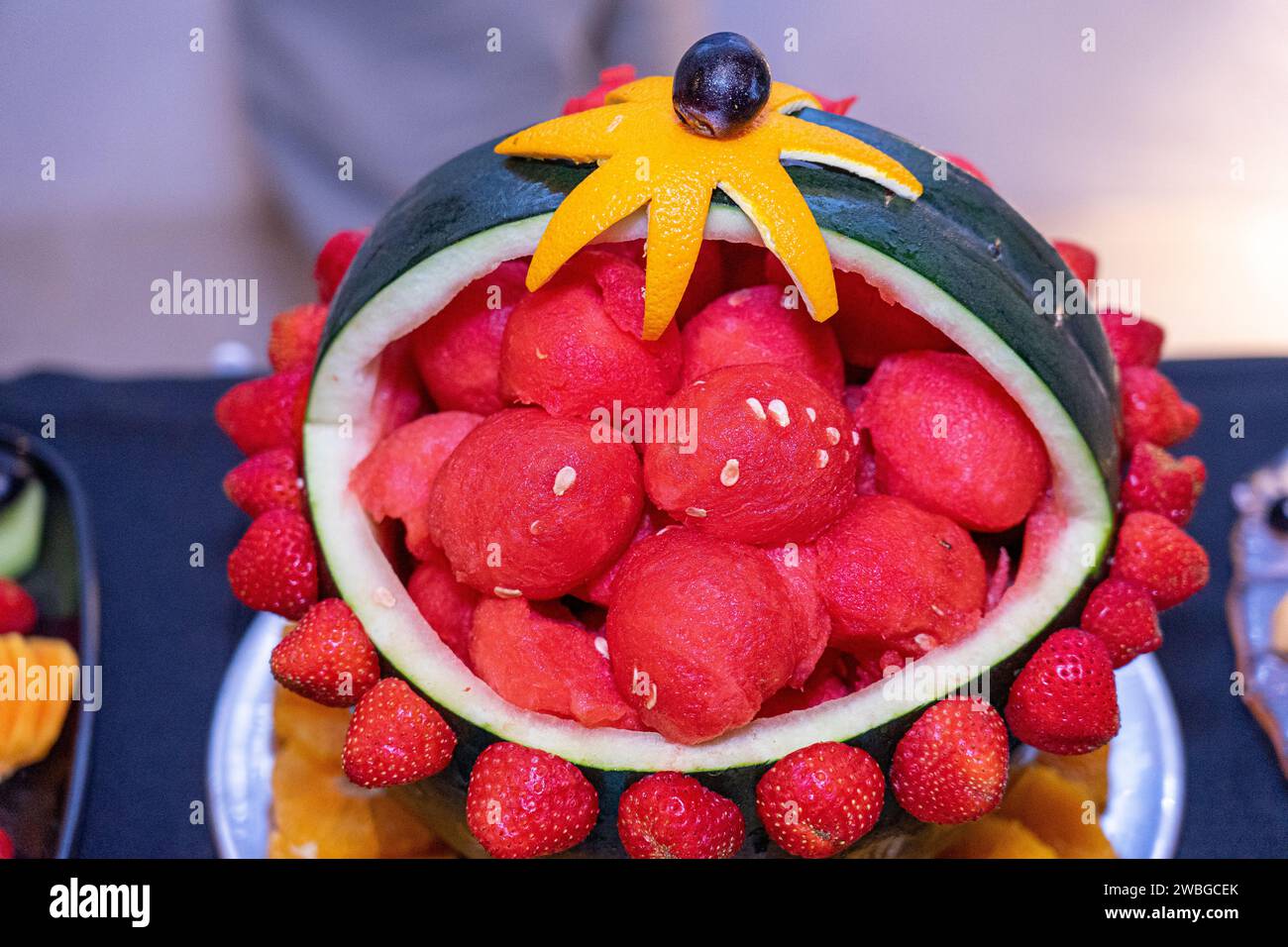 arrangement of watermelon pieces in the shape of small balls for a ...