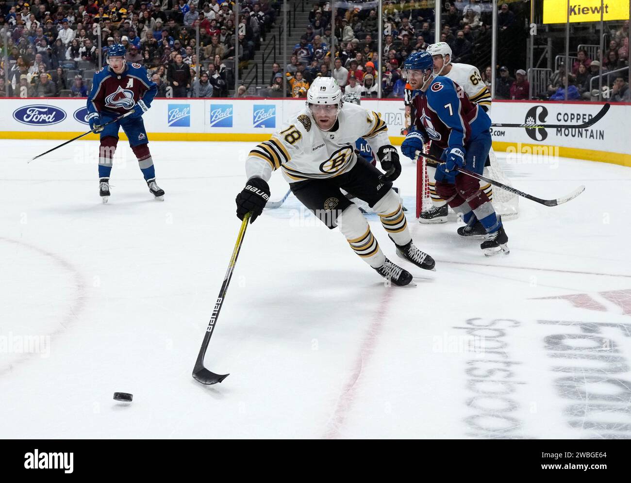 Boston Bruins center Pavel Zacha (18) pursues the puck as Colorado ...