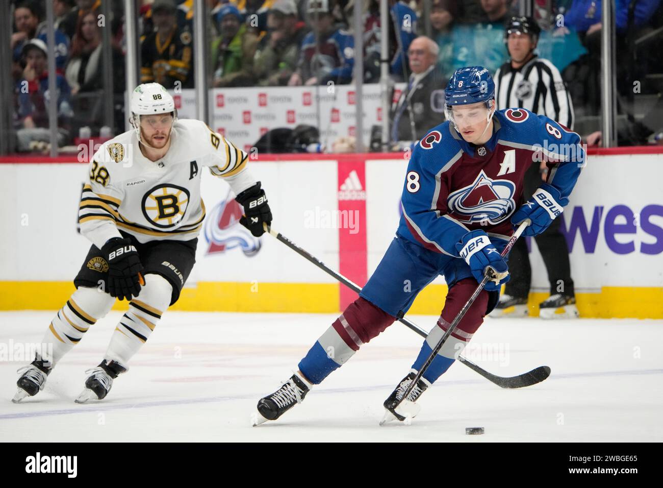 Colorado Avalanche defenseman Cale Makar (8) and Boston Bruins right ...