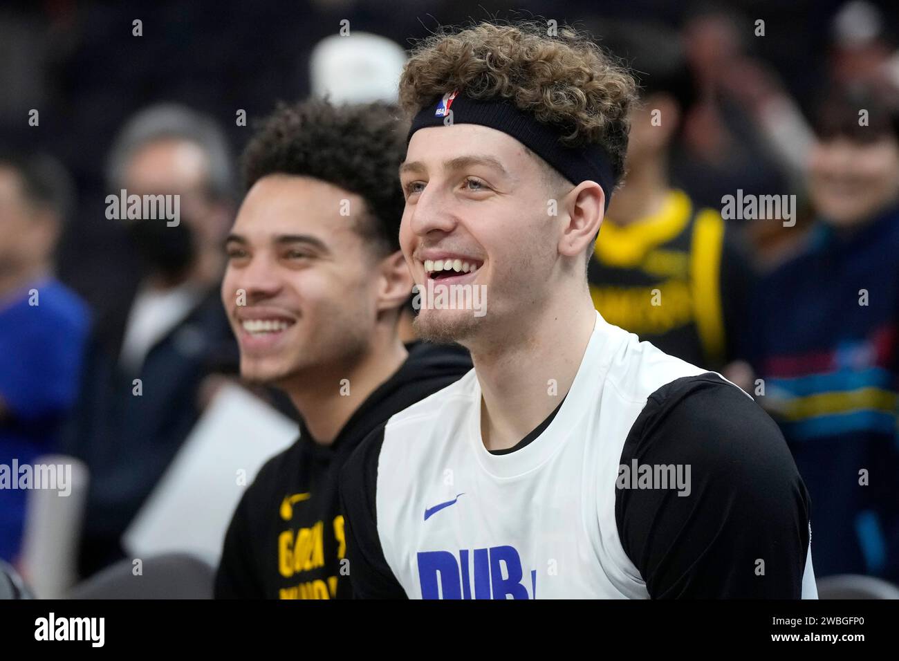 Golden State Warriors guard Lester Quinones, left, and guard Brandin ...