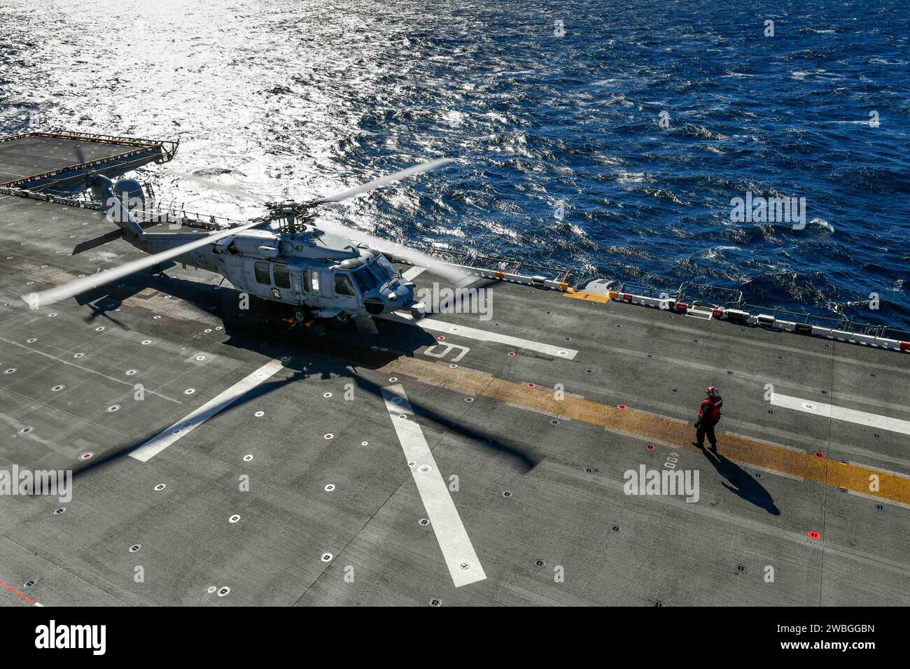 An MH-60S Sea Hawk helicopter, assigned to the “Wildcards” of ...