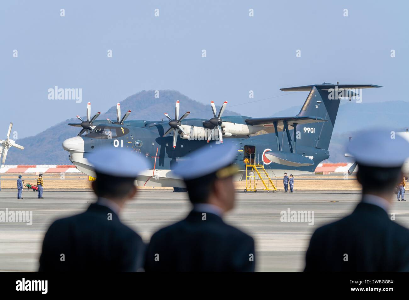 A Japan Maritime Self- Defense Force ShinMaywa US-2 sits on the tarmac ...
